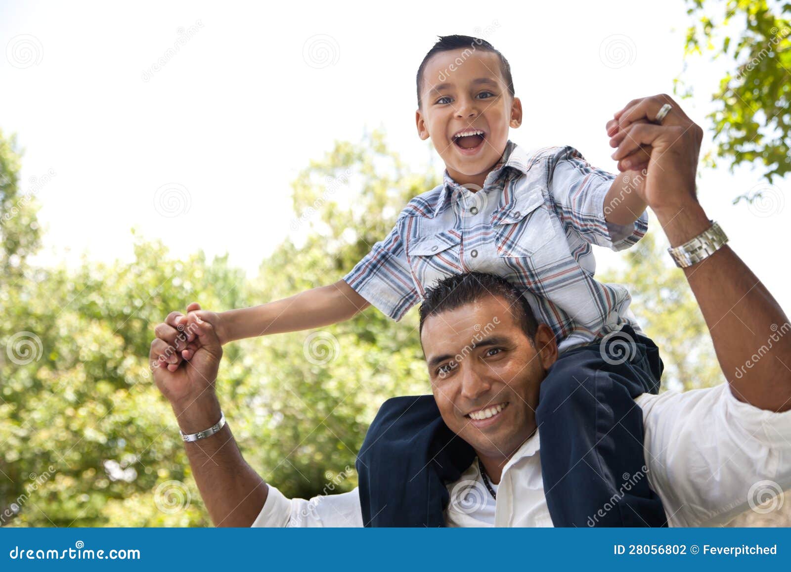 Hispanic Father and Son Having Fun in the Park Stock Photo - Image of ...