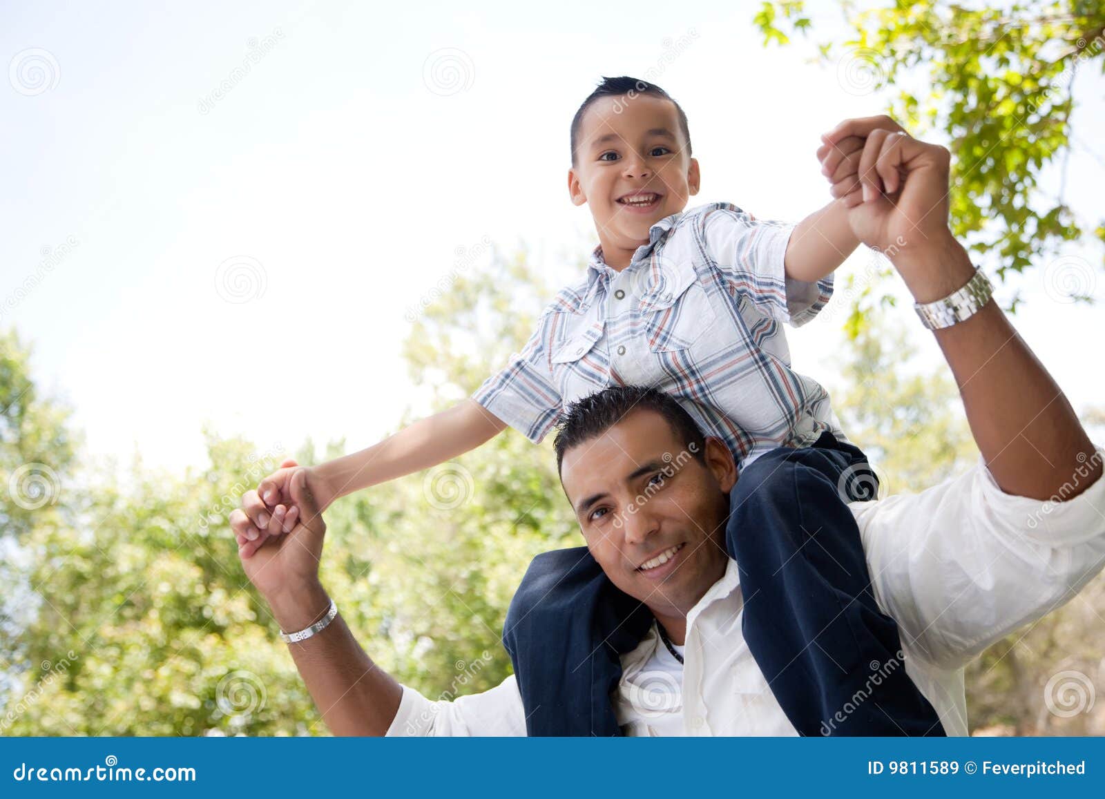 Hispanic Father and Son Having Fun in the Park Stock Image - Image of ...
