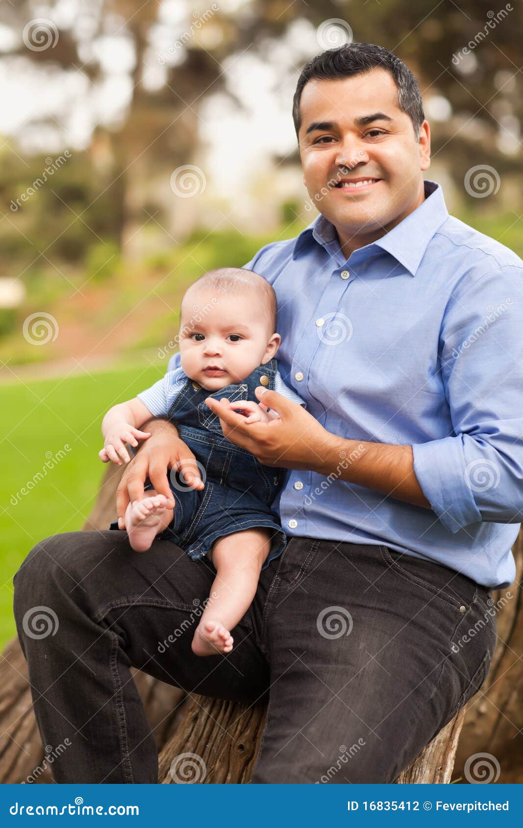 Hispanic Father Of Interracial Family Drinking A Cup Coffee Laughing ...