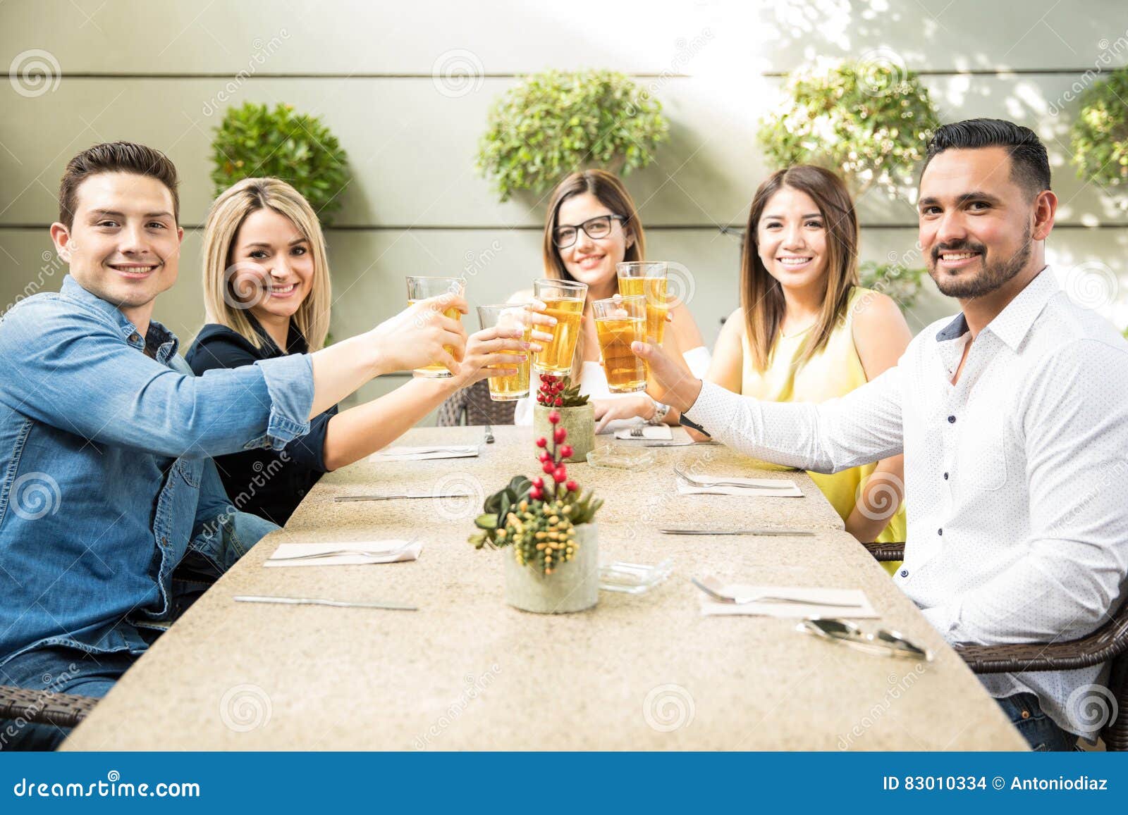 Hispanic Friends Drinking Beer Stock Photo - Image of alcohol, looking ...