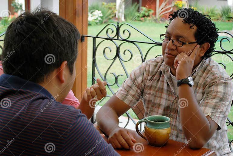 Hispanic friends talking stock photo. Image of friendship - 9197720