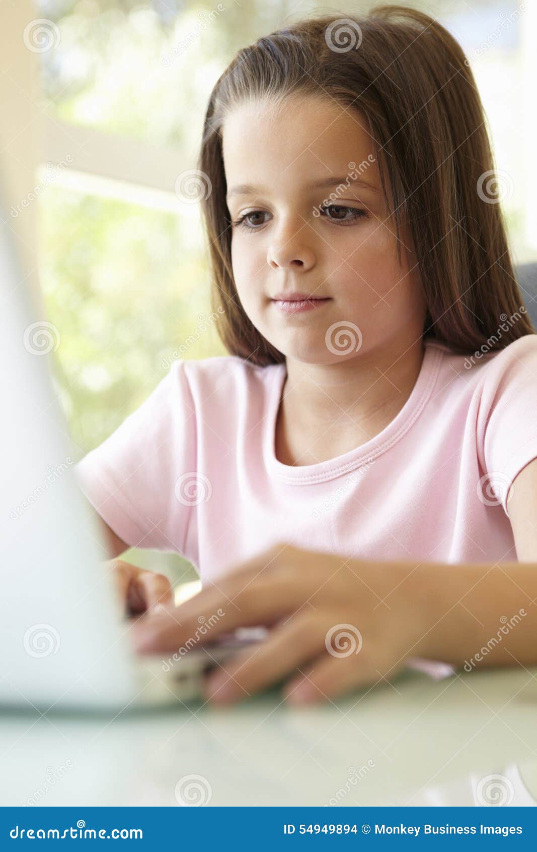 Hispanic Girl Using Laptop stock photo. Image of browsing - 54949894