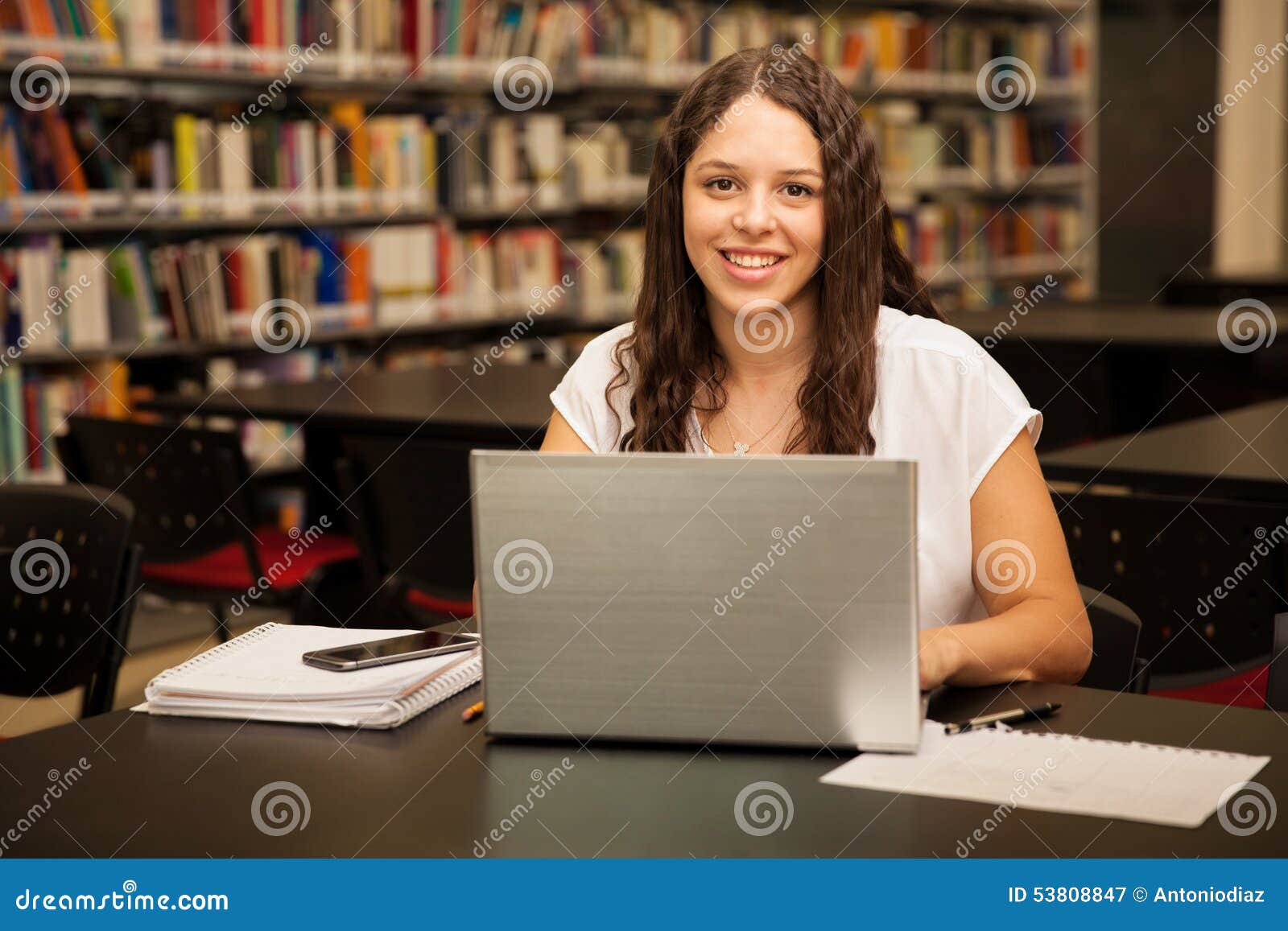 Hispanic Girl Using a Laptop Stock Image - Image of woman, young: 53808847
