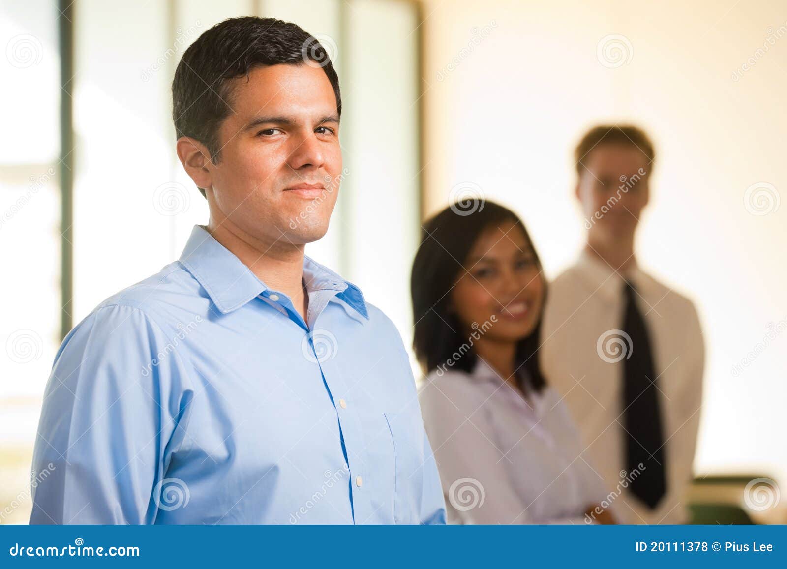 Hispanic Male Team Leader Row Stock Photo - Image of foreground, focus ...