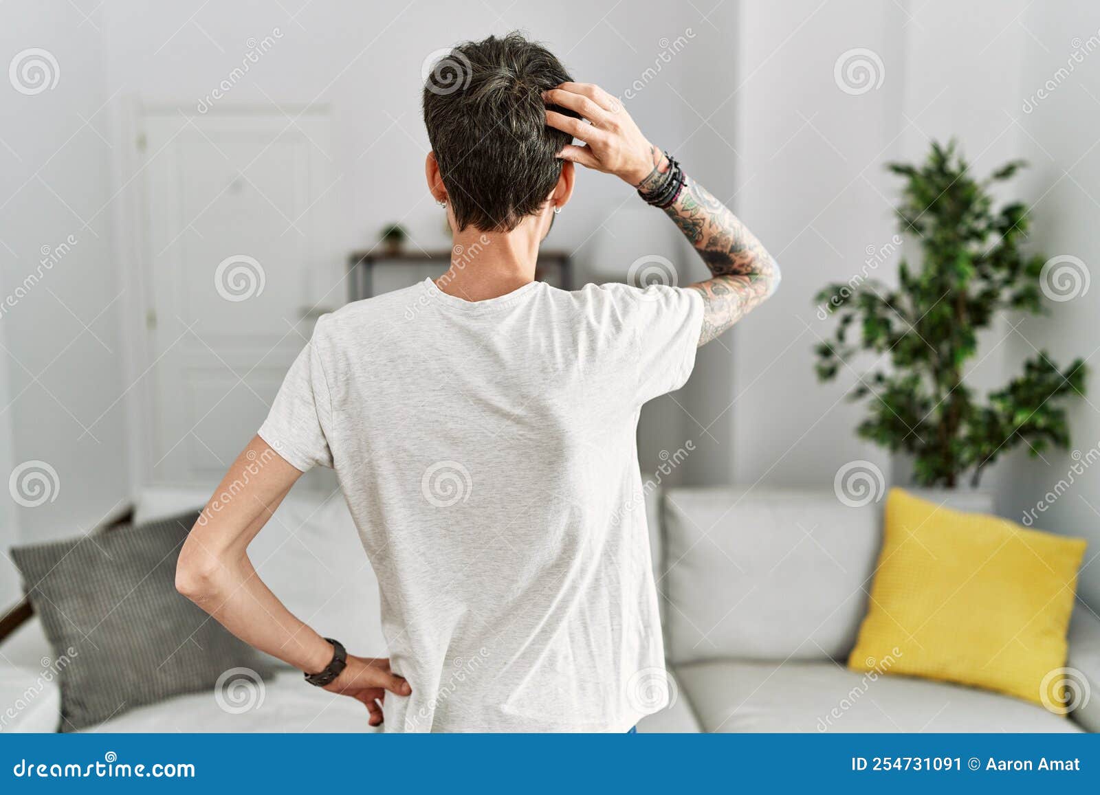 Hispanic Man with Beard at the Living Room at Home Backwards Thinking ...