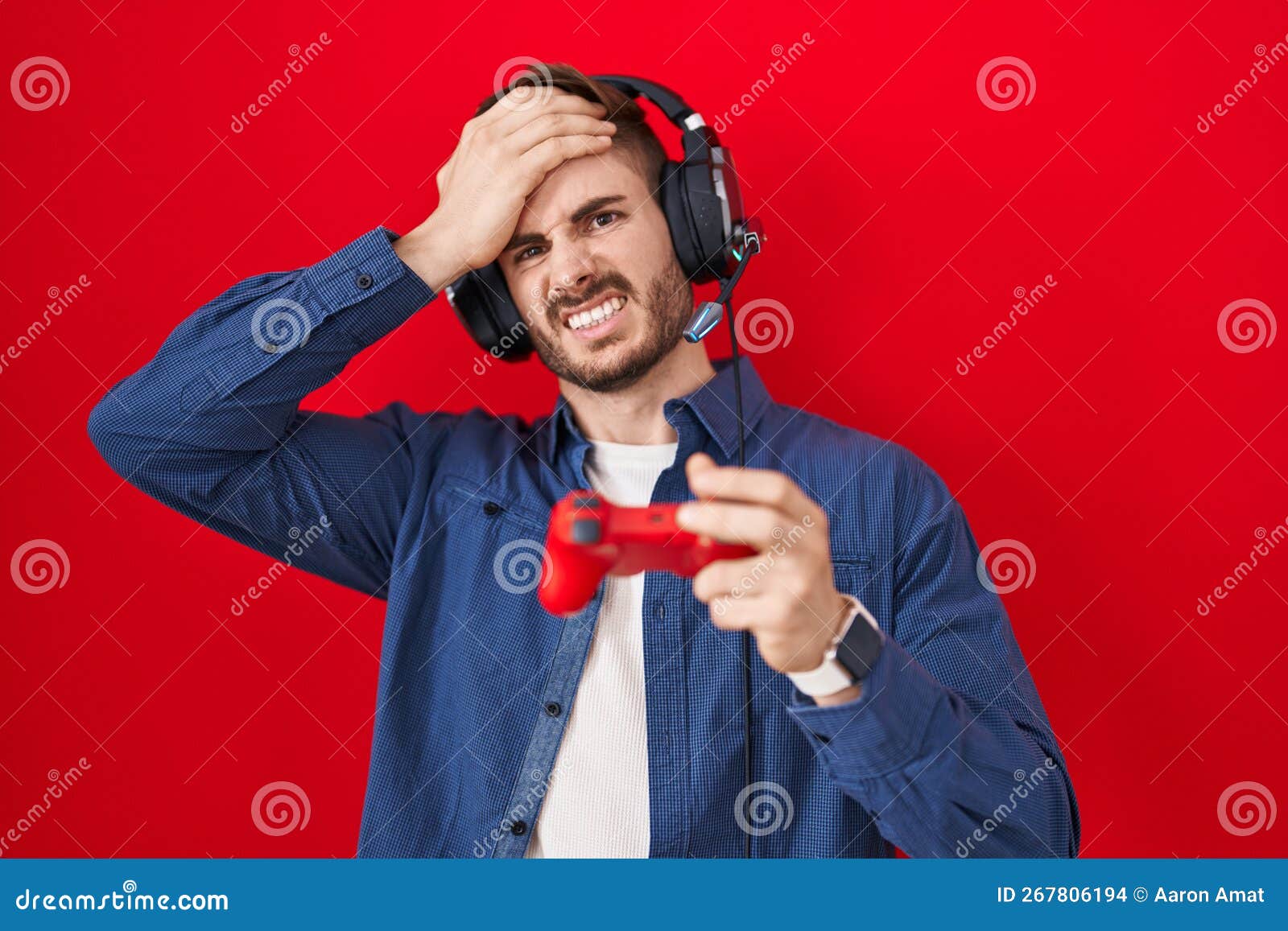 Hispanic Man with Beard Playing Video Game Holding Controller Stressed ...