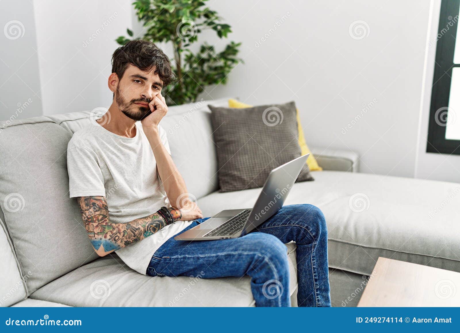 Hispanic Man with Beard Sitting on the Sofa Thinking Looking Tired and ...