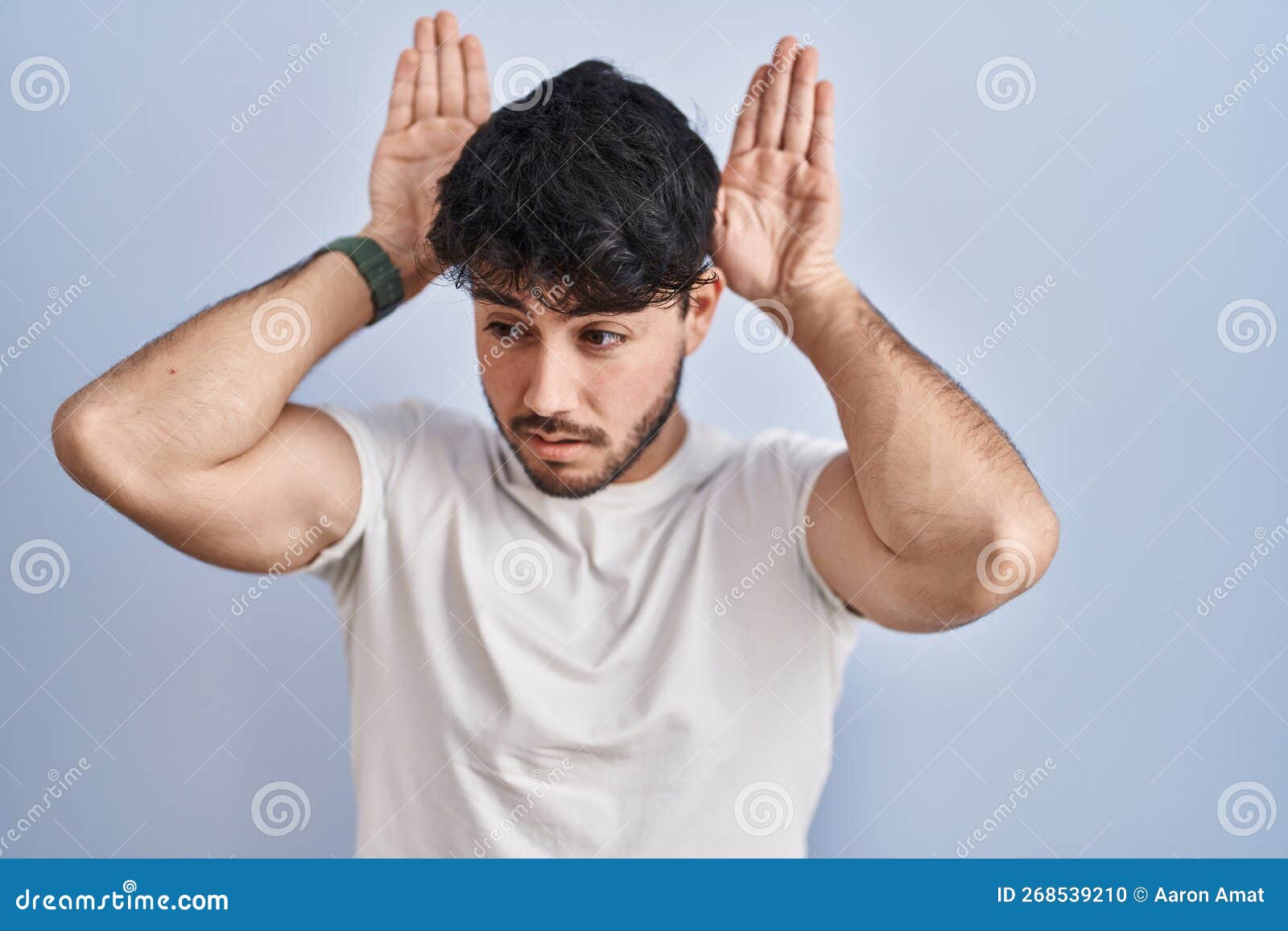 Hispanic Man with Beard Standing Over White Background Doing Bunny Ears ...