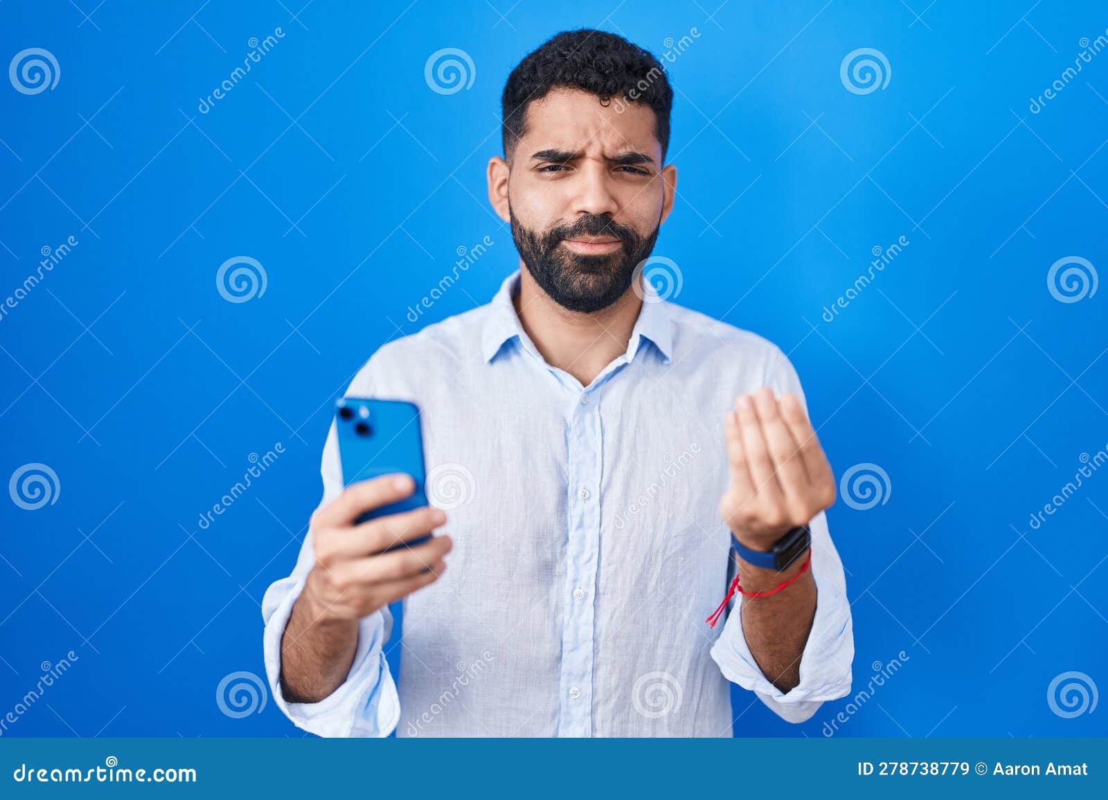 Hispanic Man With Beard Using Smartphone Typing Message Doing Money