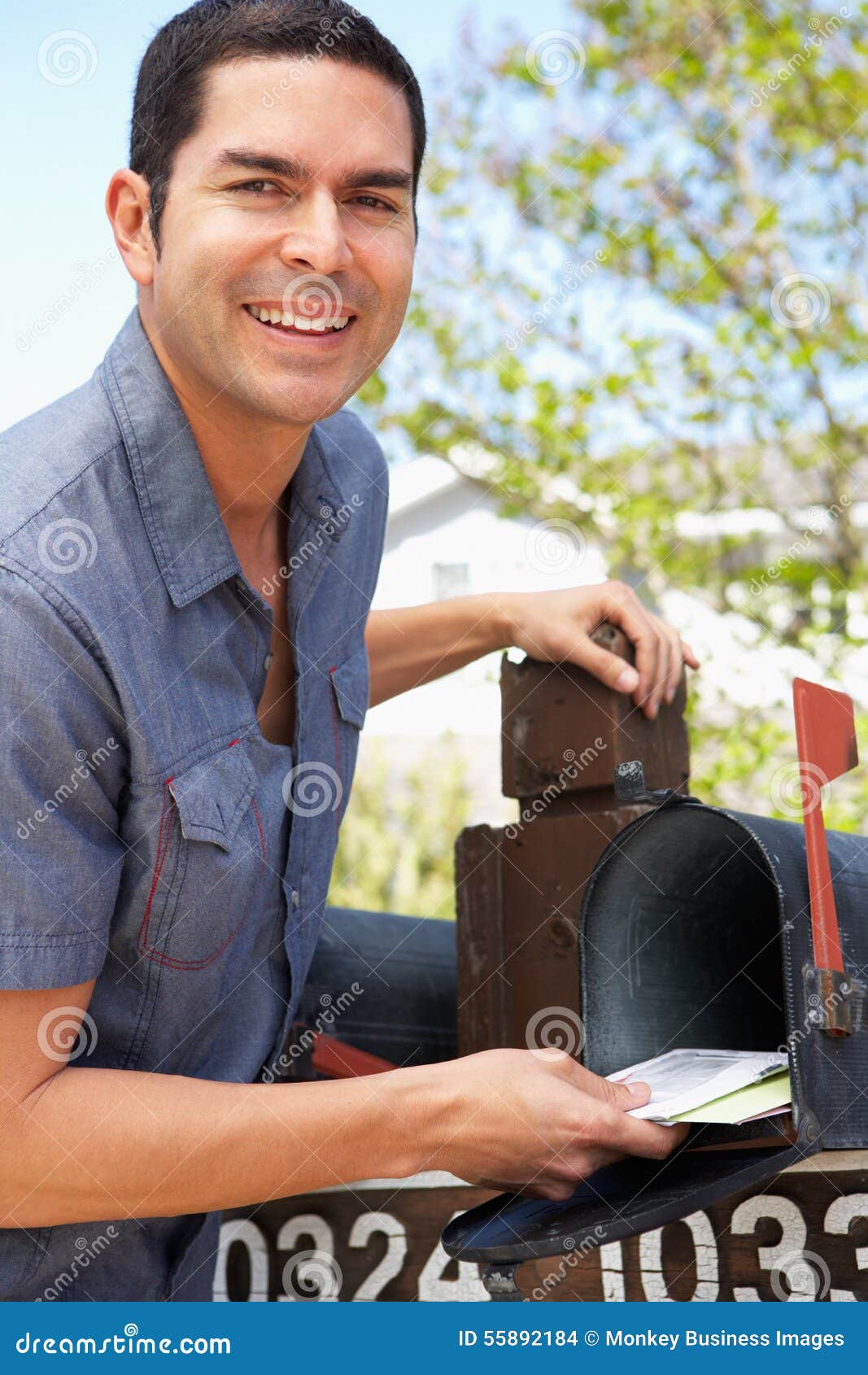Hispanic Man Checking Mailbox Stock Photo - Image of checking, smiling ...