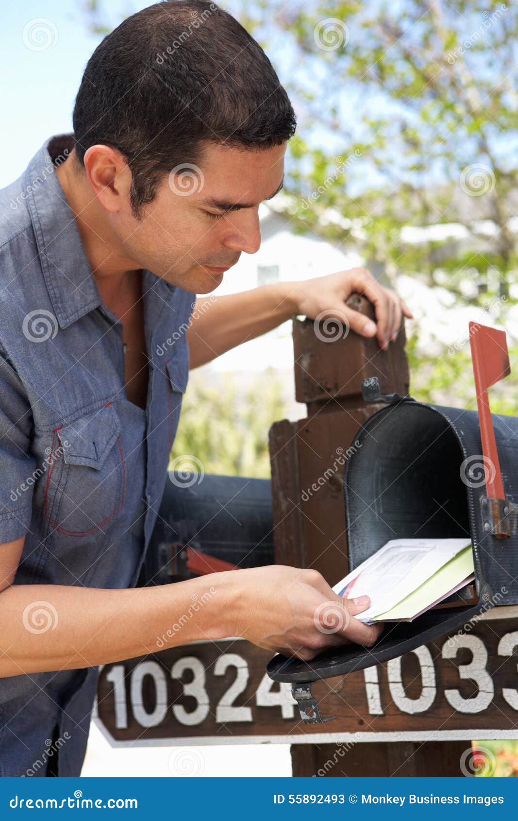 Hispanic Man Checking Mailbox Stock Image - Image of life, male: 55892493