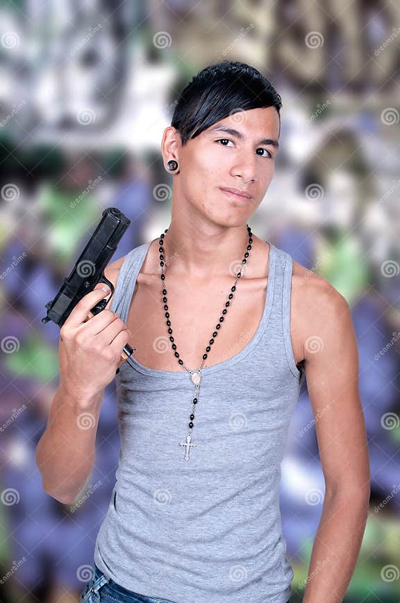 Hispanic man with Gun stock image. Image of weapon, handsome - 28519039