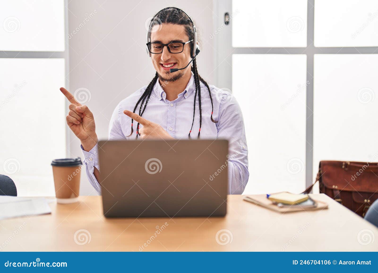 Hispanic Man with Long Hair Working Using Computer Laptop Smiling and ...