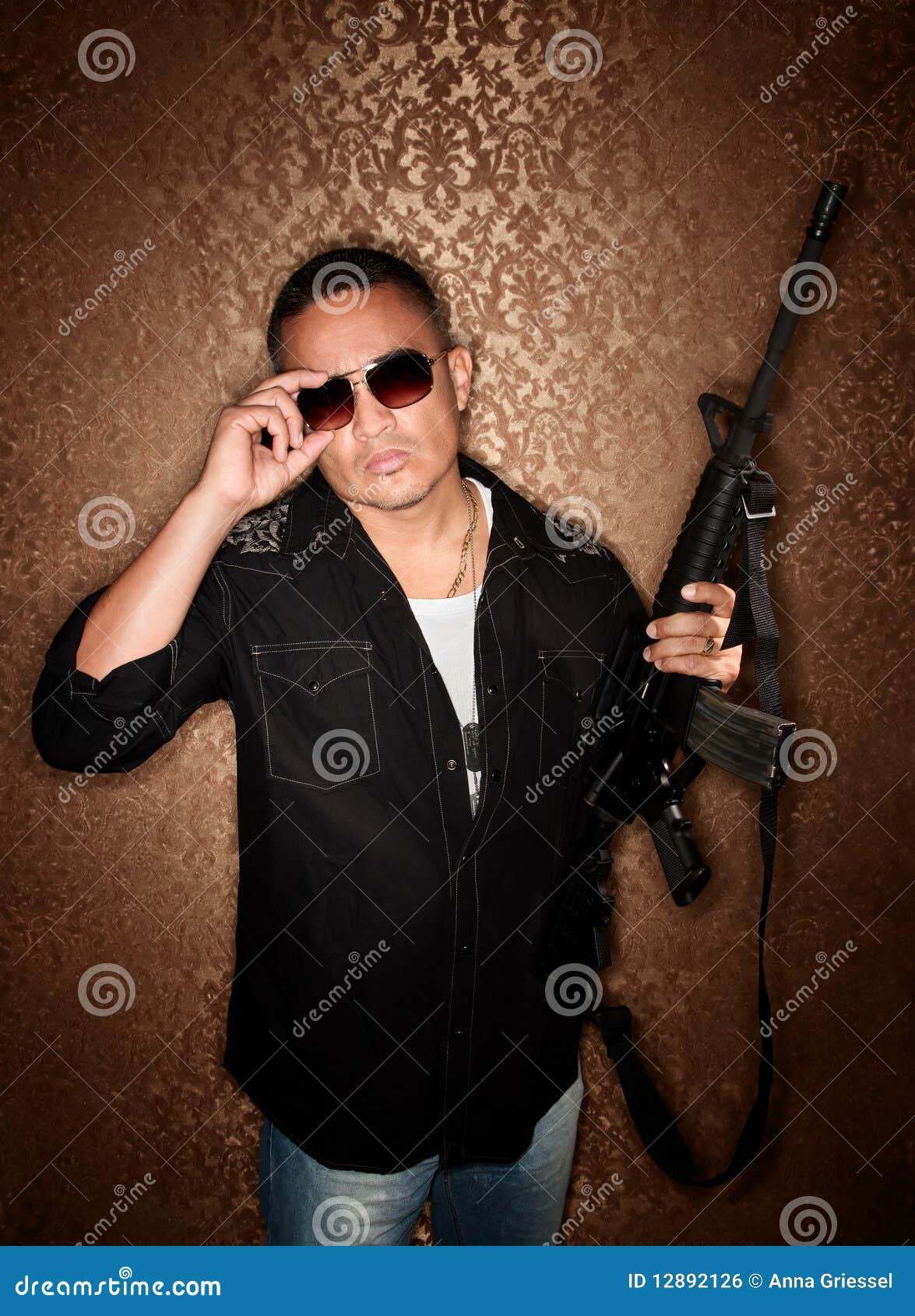 Hispanic Man with Rifle stock photo. Image of automatic - 12892126