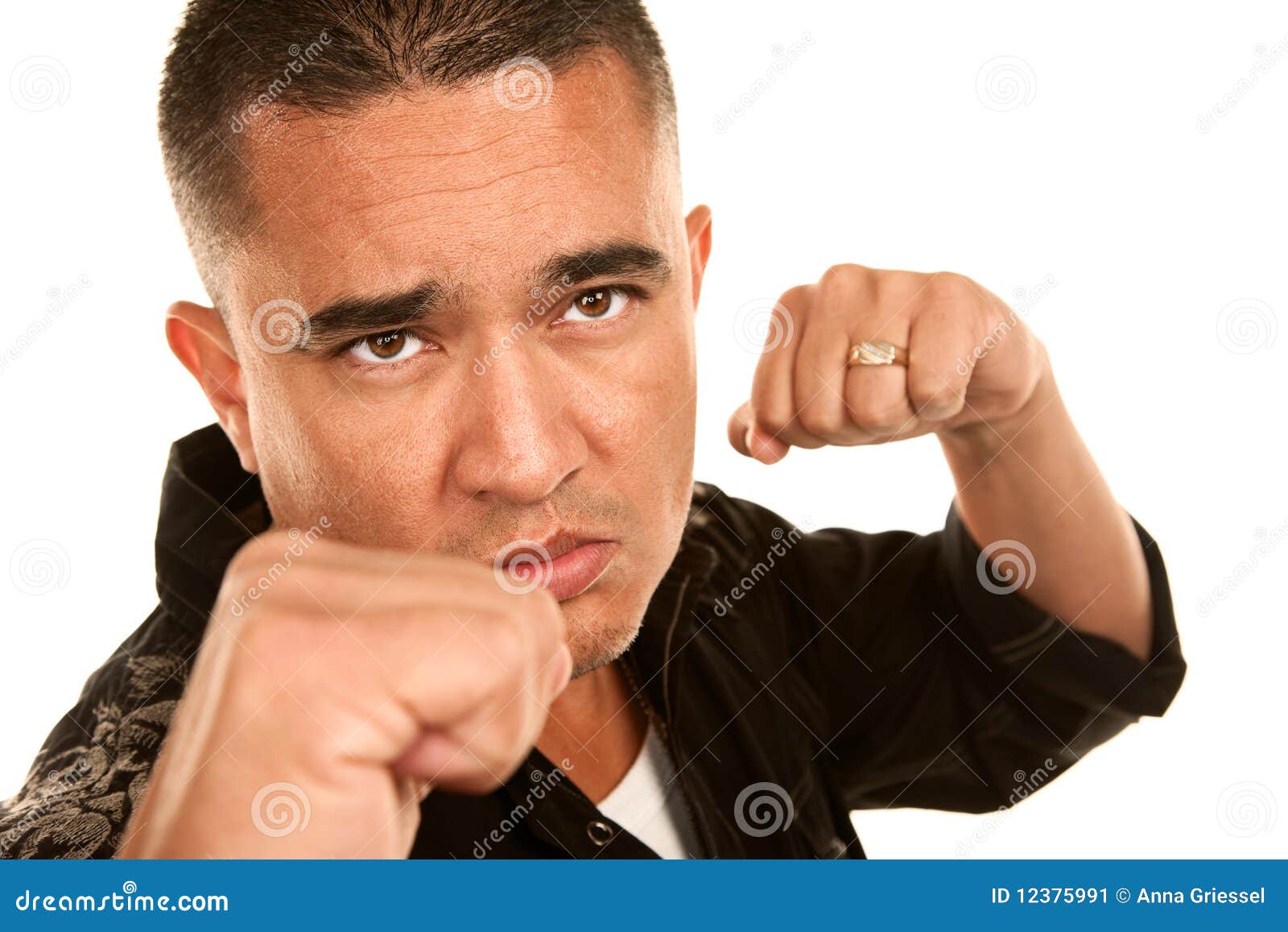 Hispanic Man Throwing Punch Stock Image - Image of violent, latino ...
