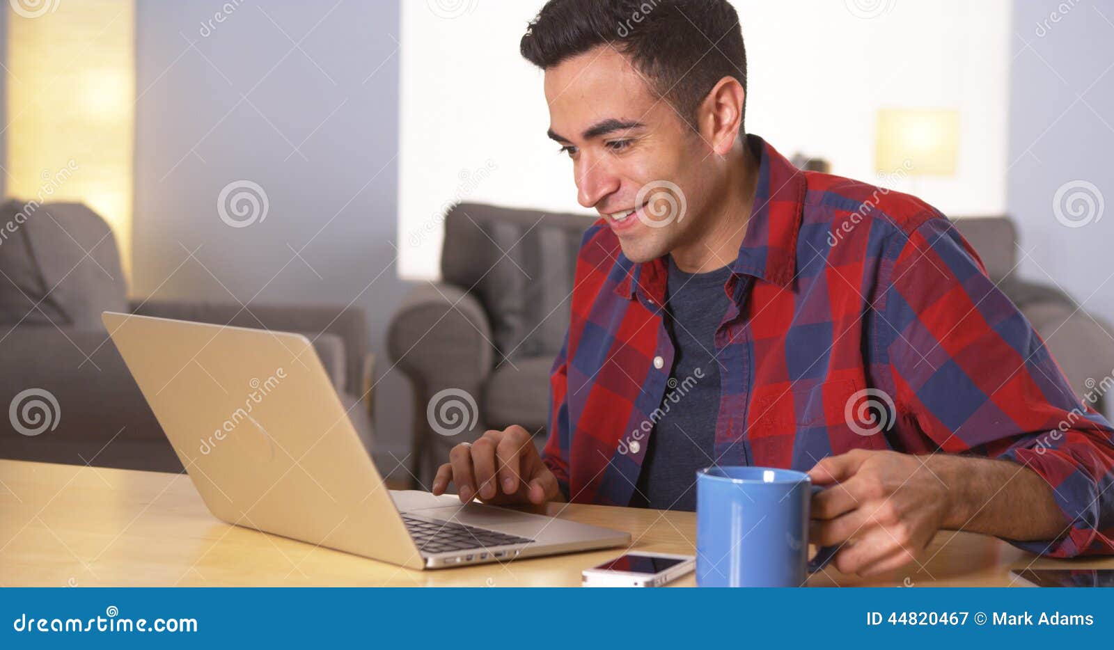 Hispanic Man Working on Laptop Stock Image - Image of casual, hispanic ...