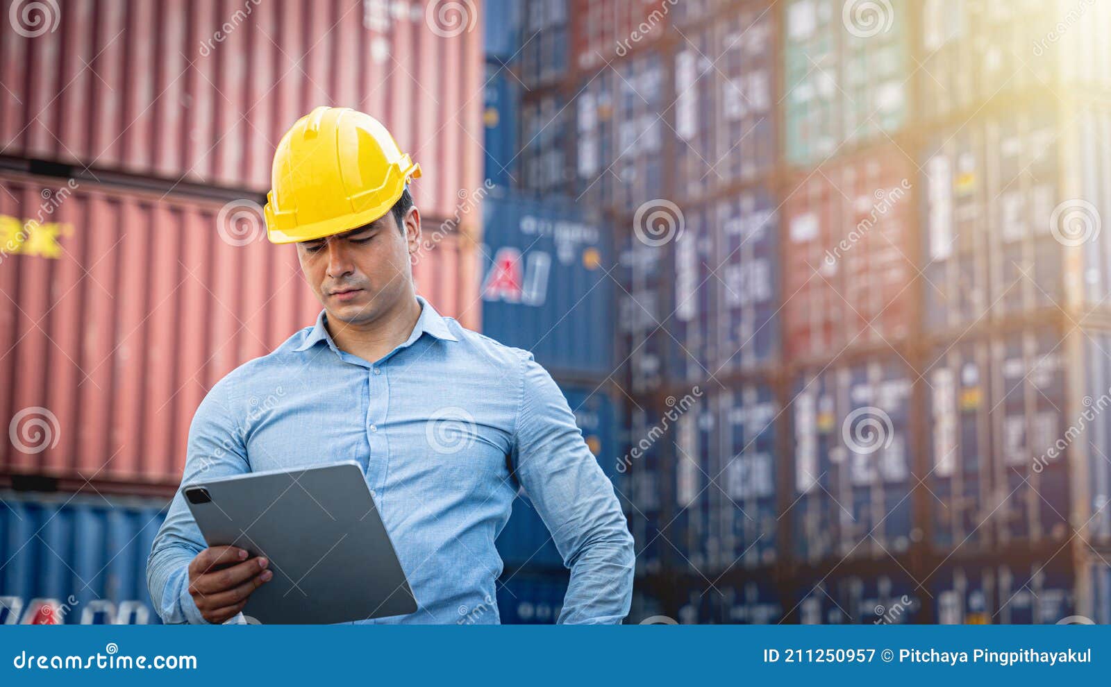 Hispanic Manager Checking on a Tablet at Shipping Container Yard. Stock ...