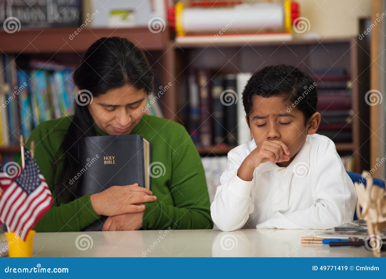 Hispanic Mom and Boy Praying during Worship Stock Image - Image of ...