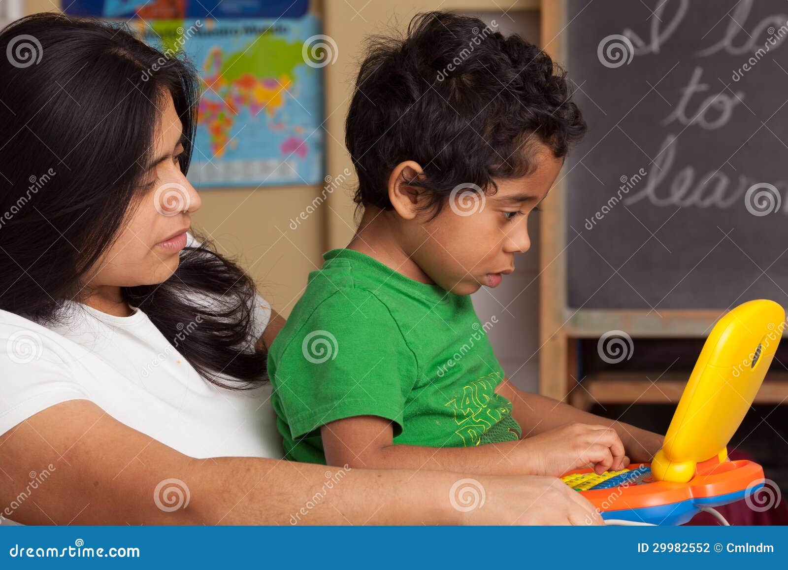 Hispanic Child Learning stock photo. Image of sitting - 29982552