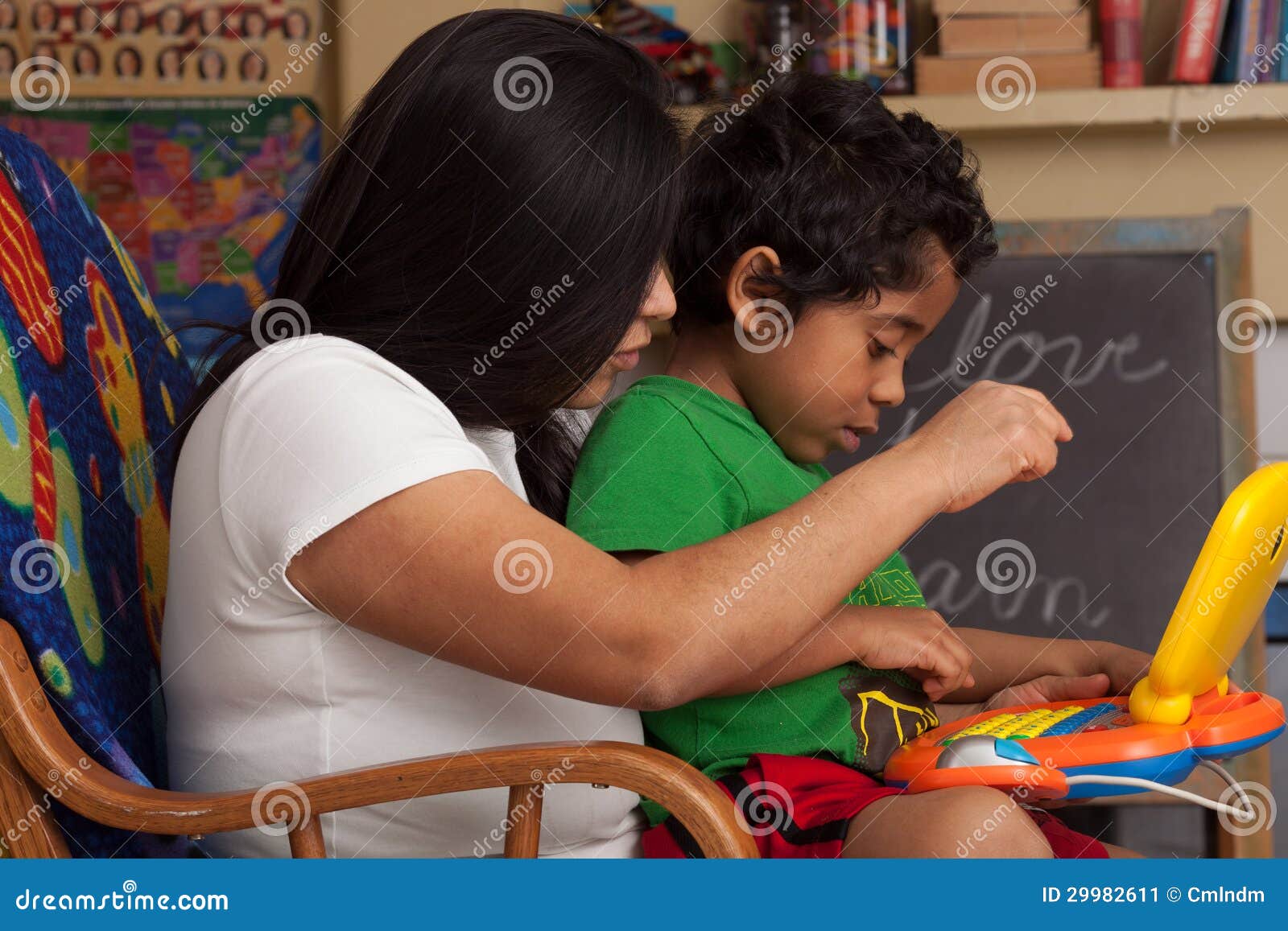 Hispanic Child Learning stock image. Image of woman, daycare - 29982611