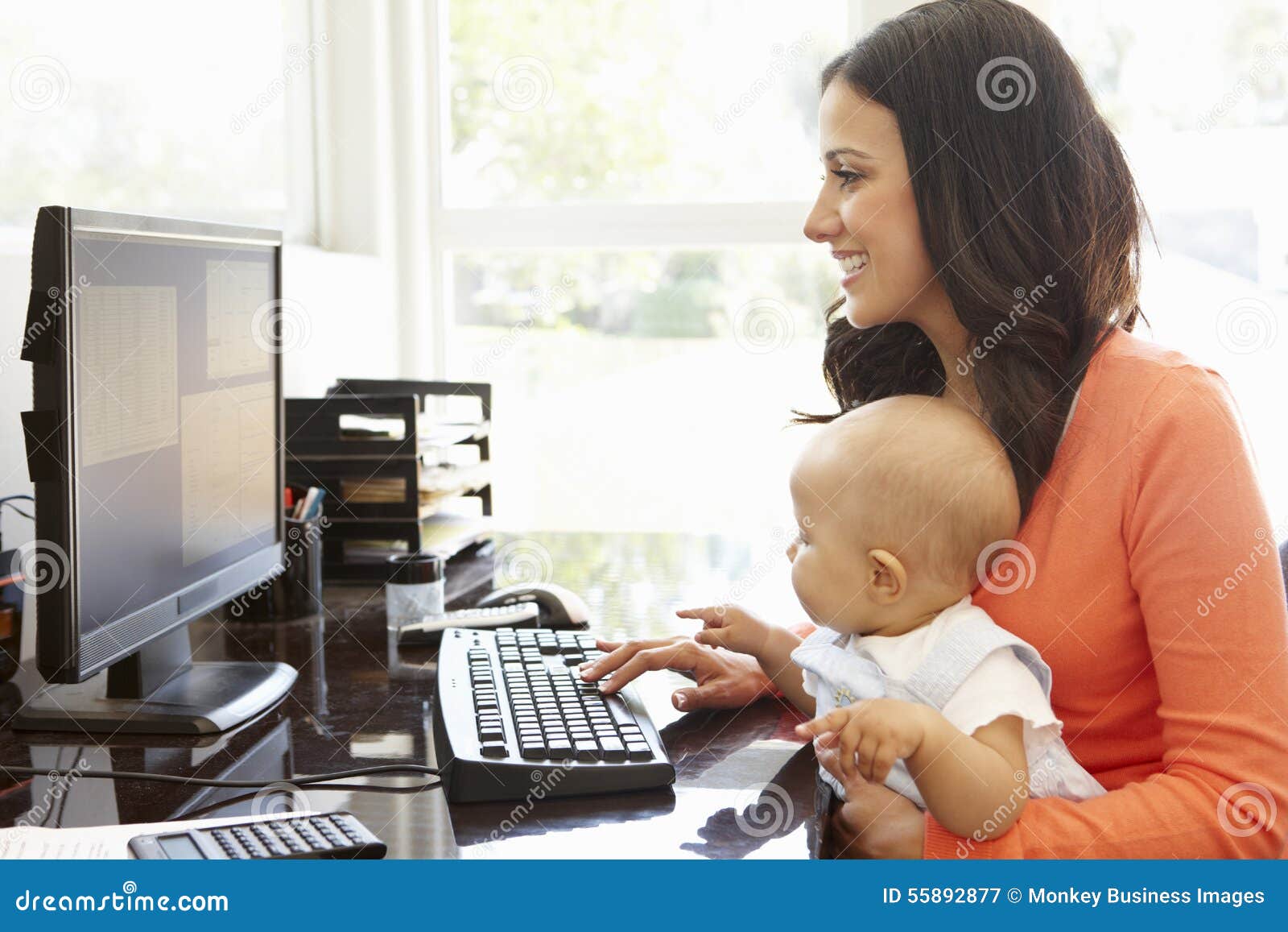 Hispanic Mother with Baby Working in Home Office Stock Image - Image of ...