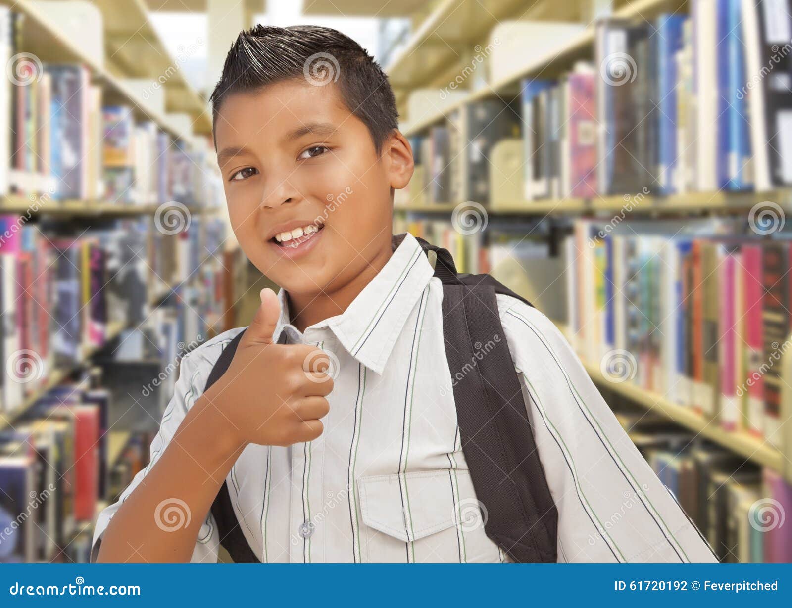 Hispanic Student Boy with Thumbs Up in the Library Stock Photo - Image ...