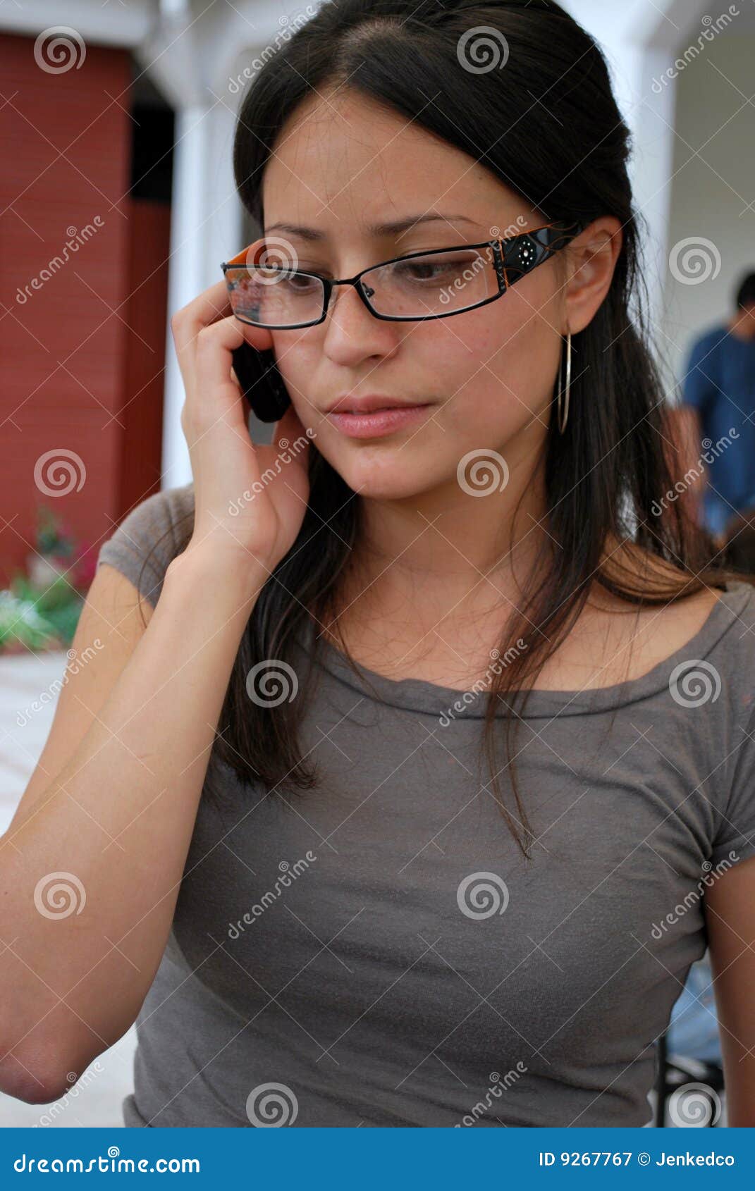 Hispanic Students Talking on Their Cellphones Stock Image - Image of ...