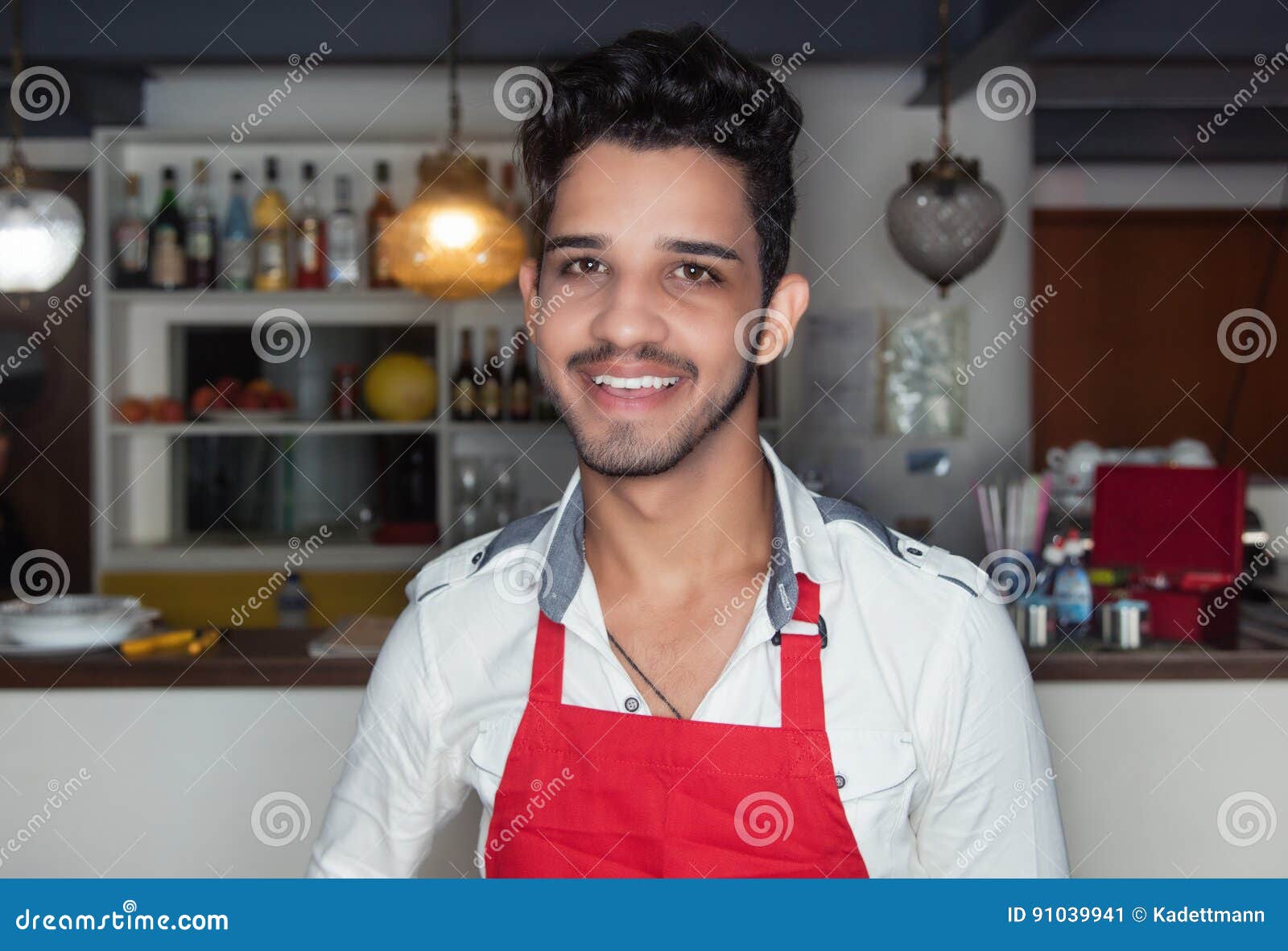 Hispanic Waiter in Front of a Bar Stock Image - Image of copyspace ...