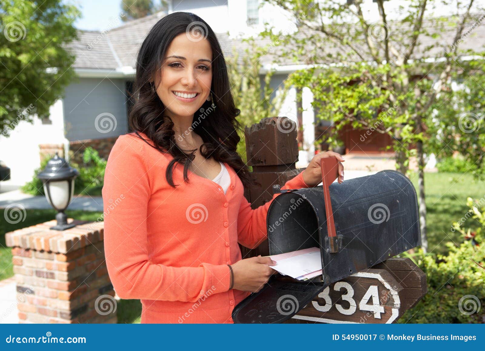Hispanic Woman Checking Mailbox Stock Image - Image of news, life: 54950017