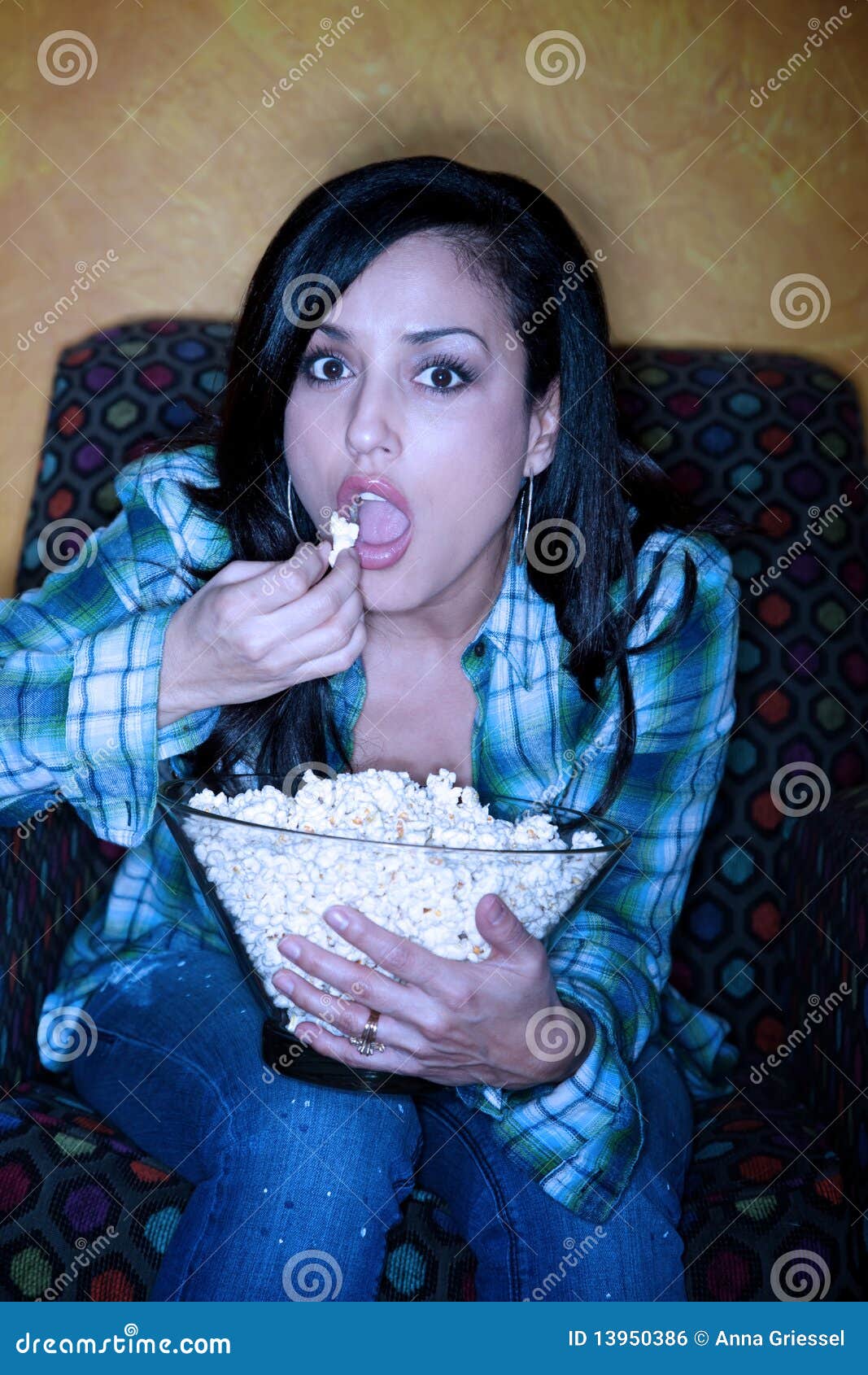 Hispanic Woman with Popcorn Watching Television Stock Photo - Image of ...