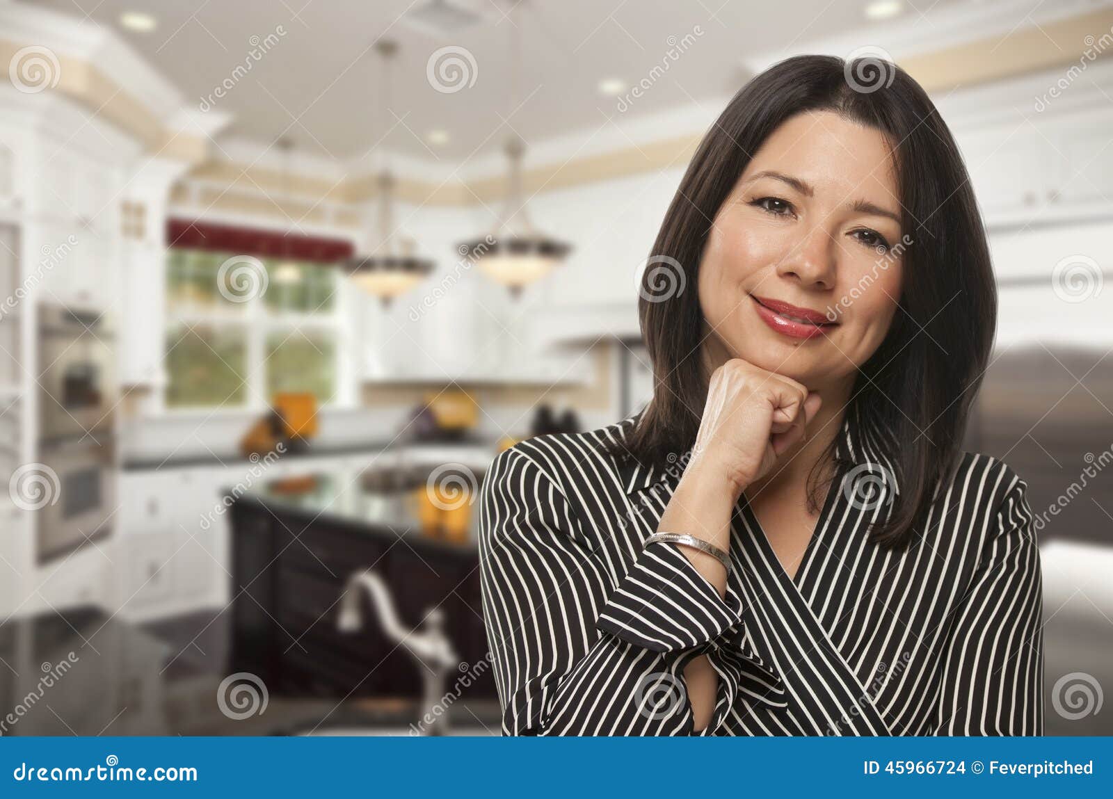 Hispanic Woman Standing in Beautiful Custom Kitchen Stock Photo - Image ...