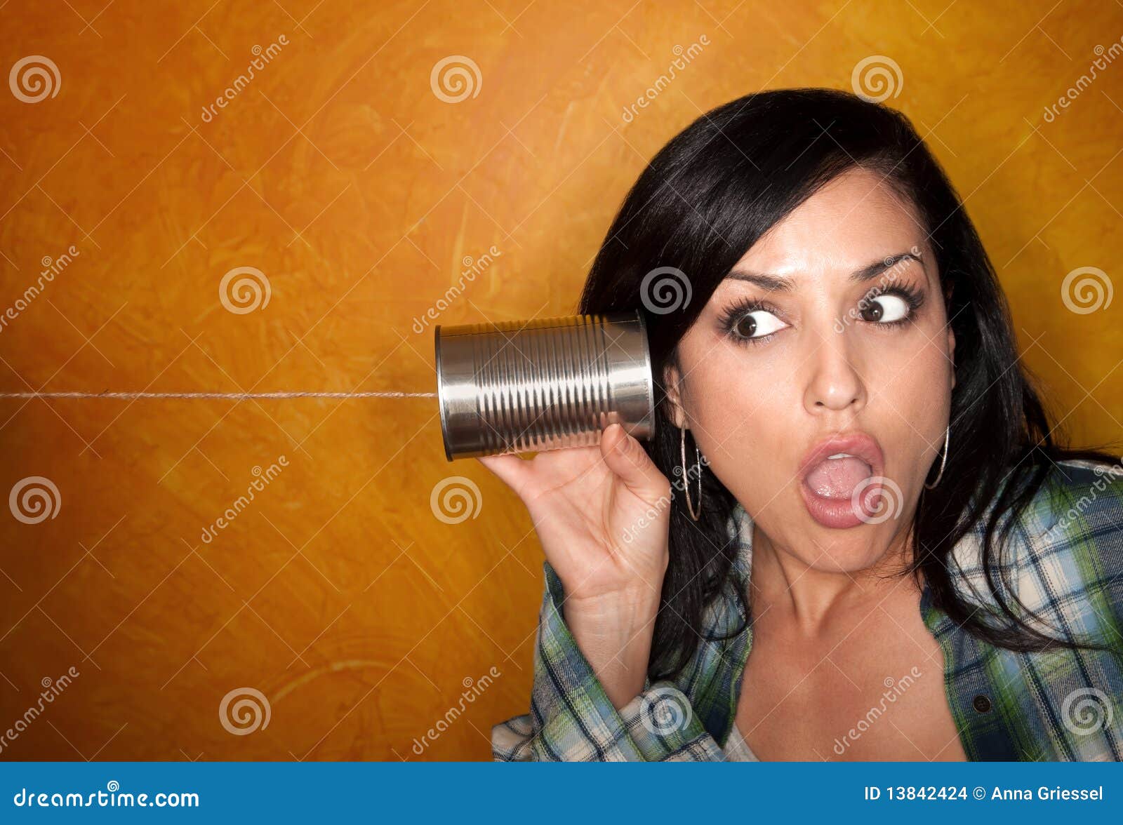 Hispanic Woman with Tin Can Telephone Stock Photo - Image of tense ...