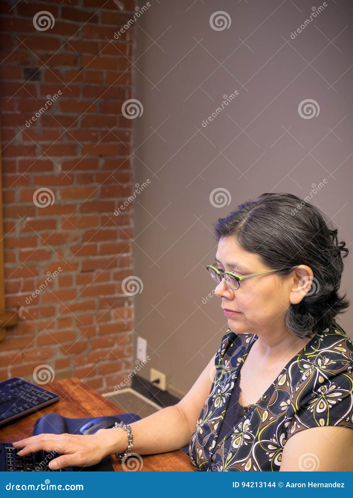 Hispanic Woman Using Computer at Work Stock Photo - Image of beautiful ...