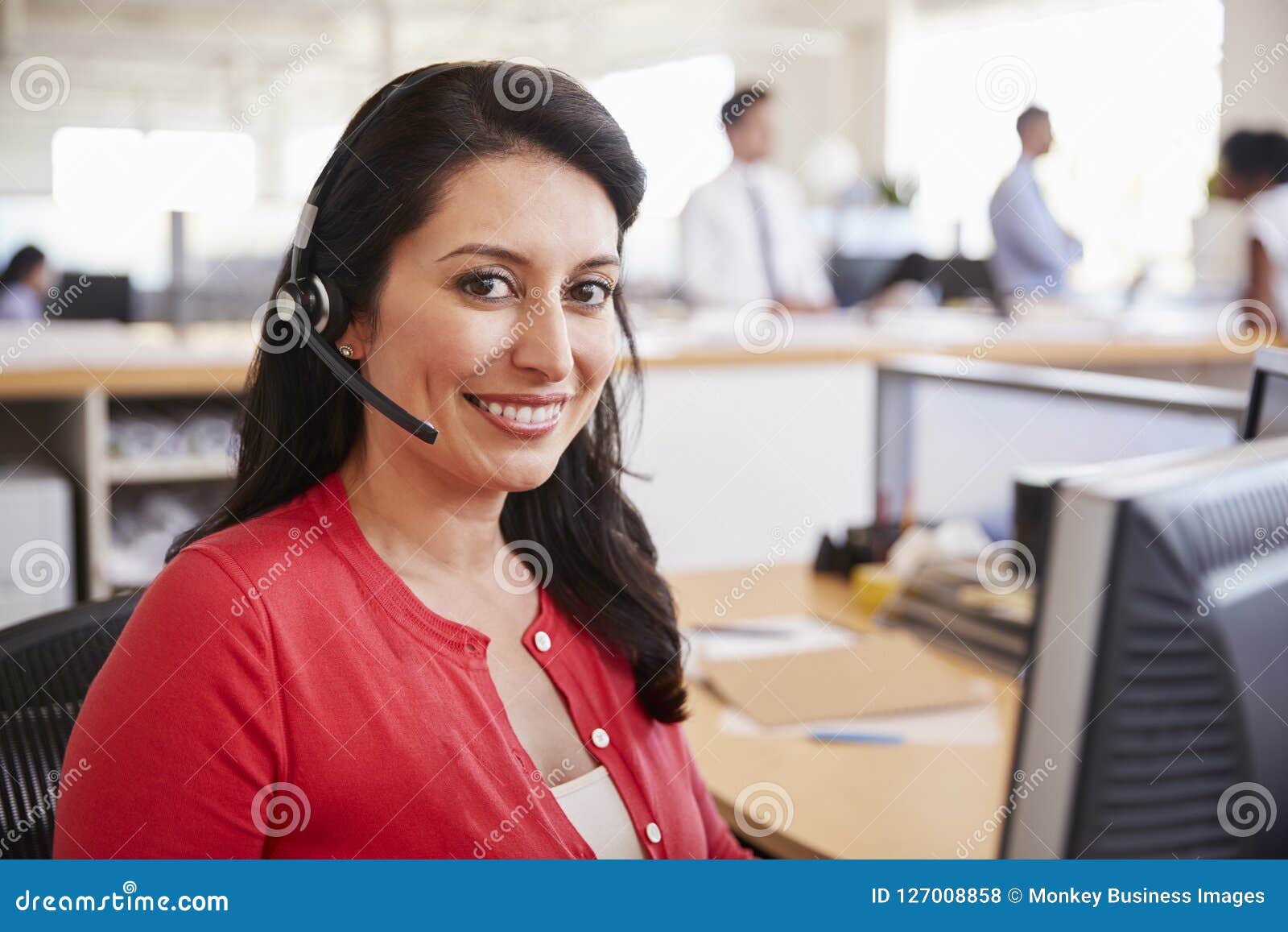 Hispanic Woman Working in a Call Centre Smiling To Camera Stock Photo ...