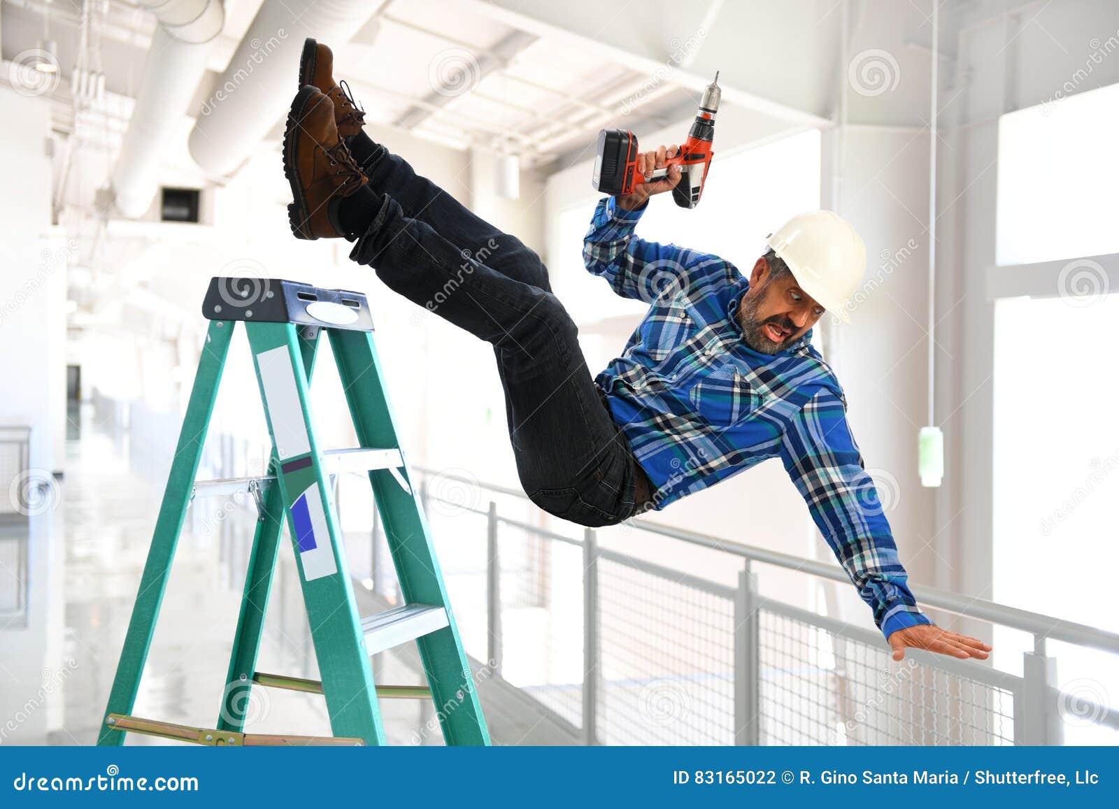 Hispanic Worker Falling from Ladder Stock Photo - Image of interior ...