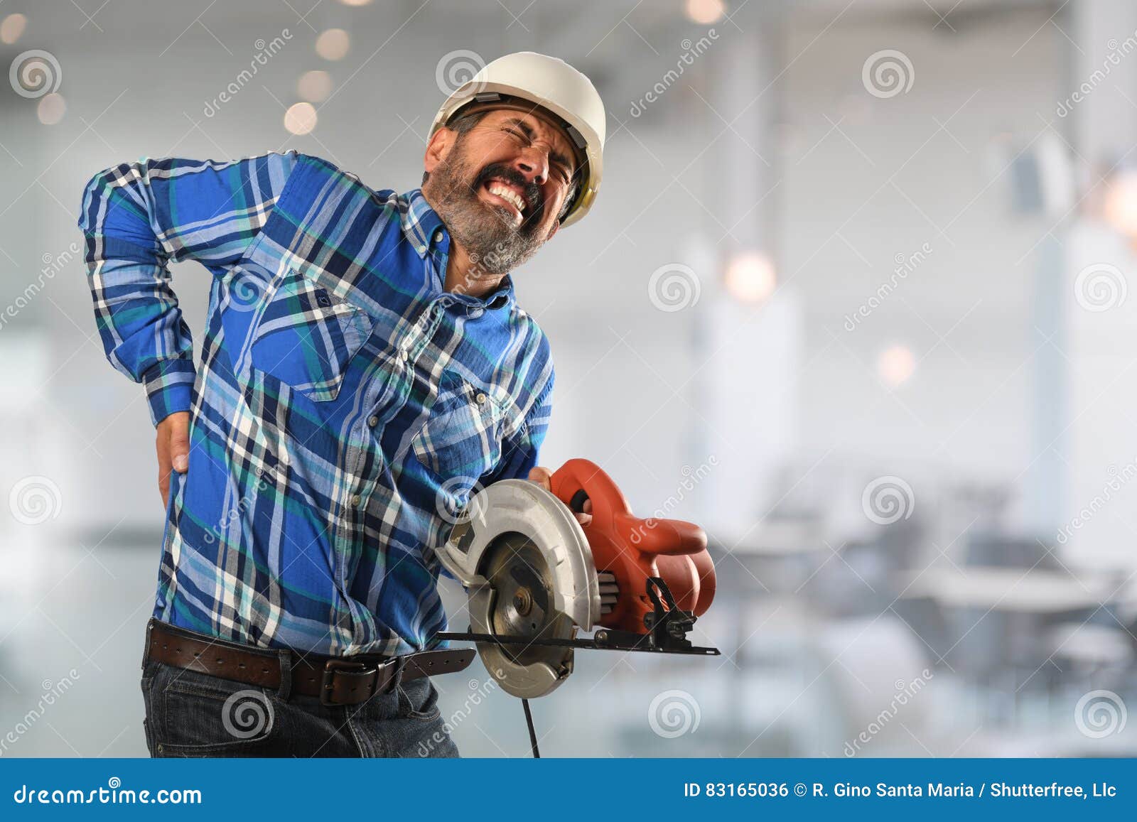 Hispanic Worker Suffering Back Injury Stock Photo - Image of hard ...