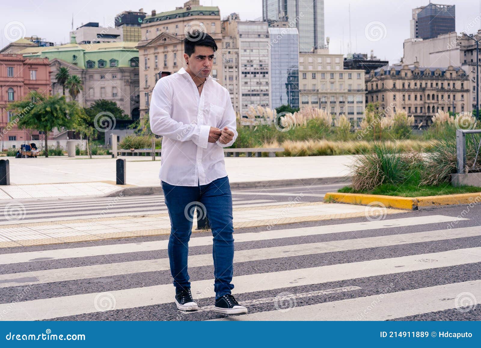 Hispanic Young Man Crossing the Street. Urban Content Stock Image ...