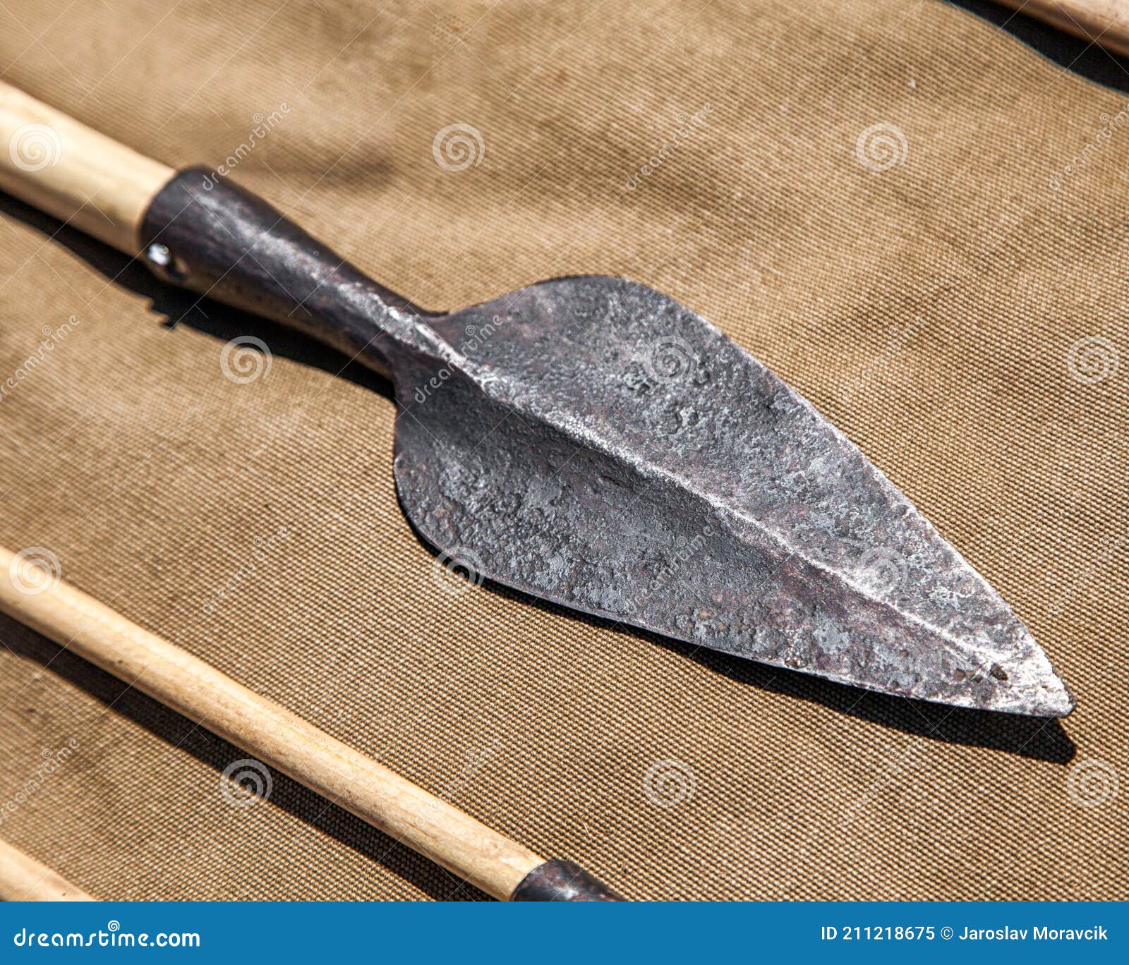 Historic Arrow with Iron Arrowhead Stock Image - Image of spear, stone ...