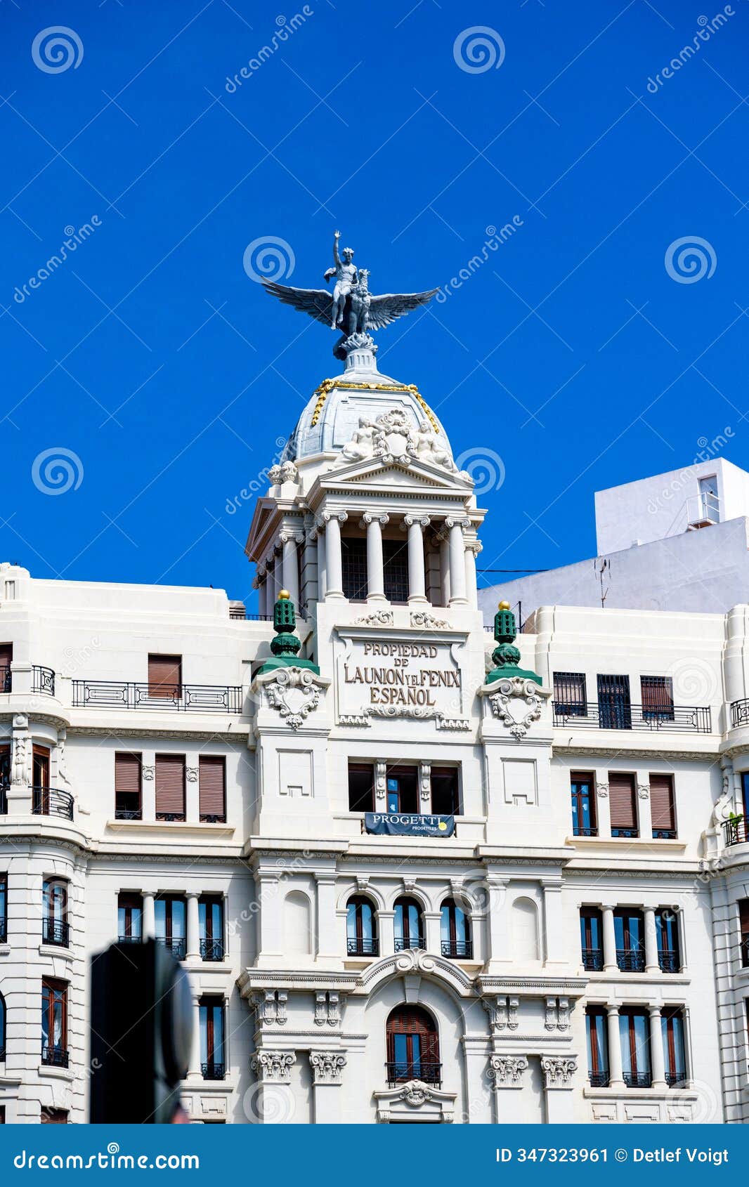 Historic Building in Valencia with Classical Facade and Winged Statue ...