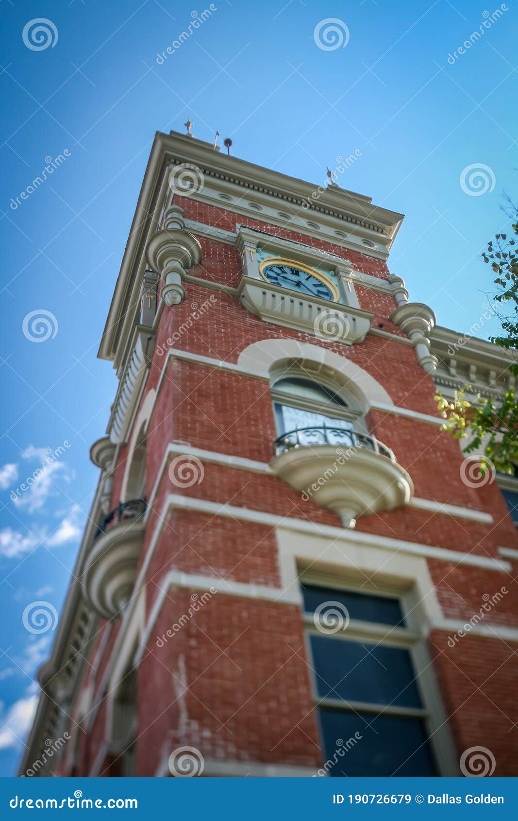 Historic Clocktower Building Against a Blue Sky Stock Image - Image of ...