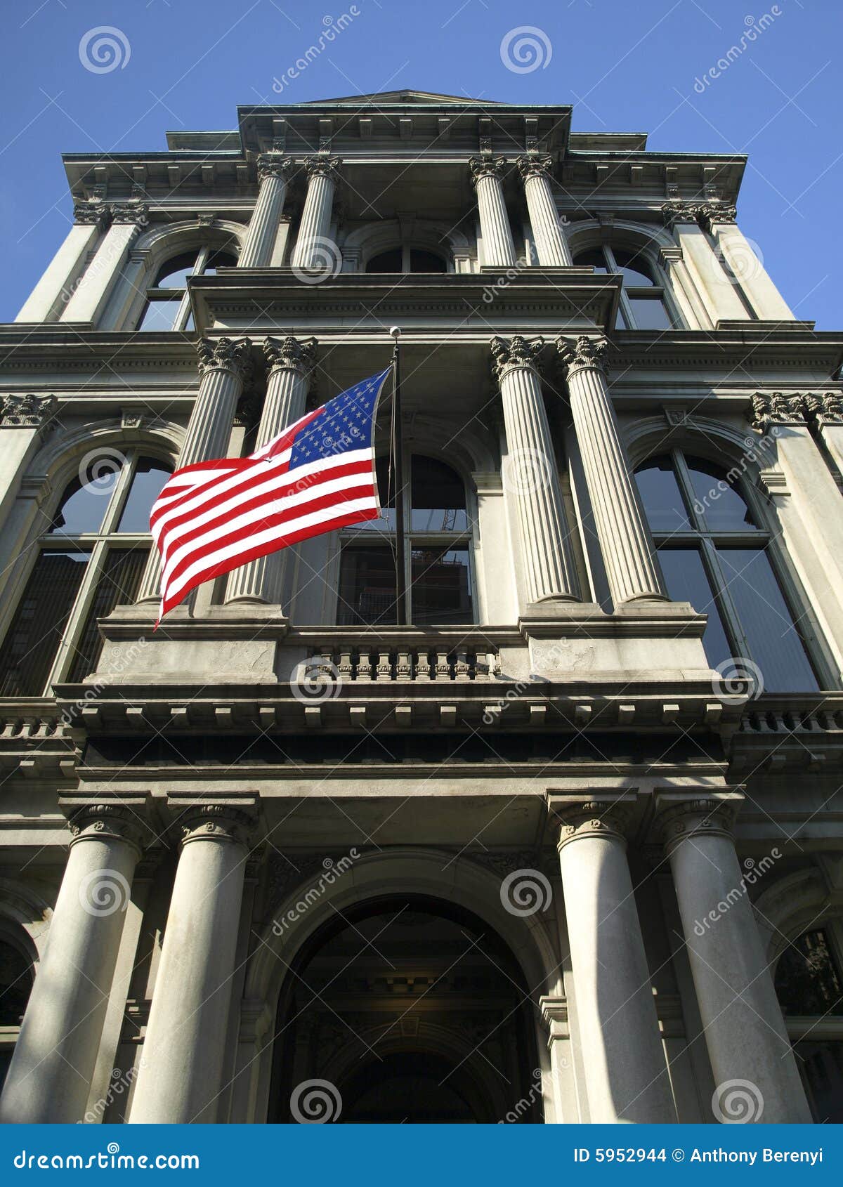 Historic Column Building with US Flag Stock Photo - Image of romanesque ...