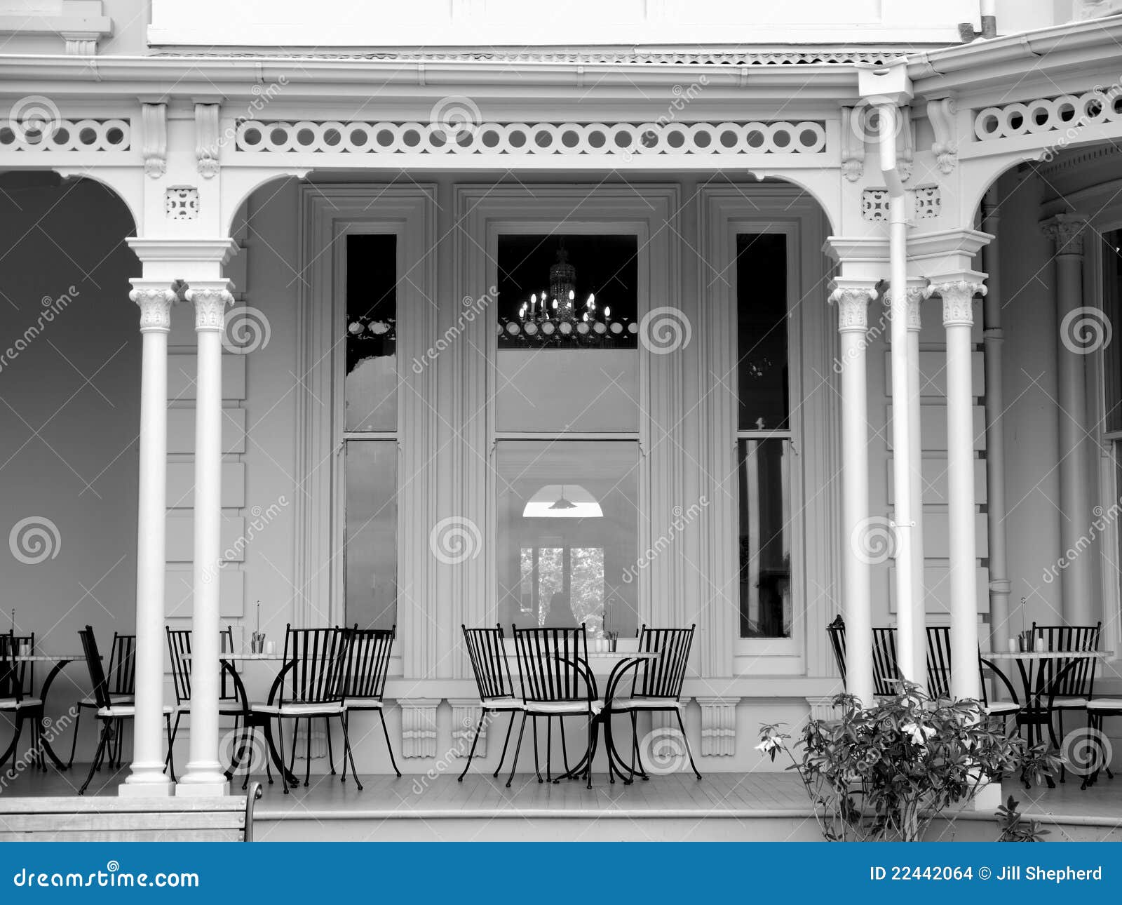 Historic Home: Verandah Cafe - H Stock Photo - Image of round ...