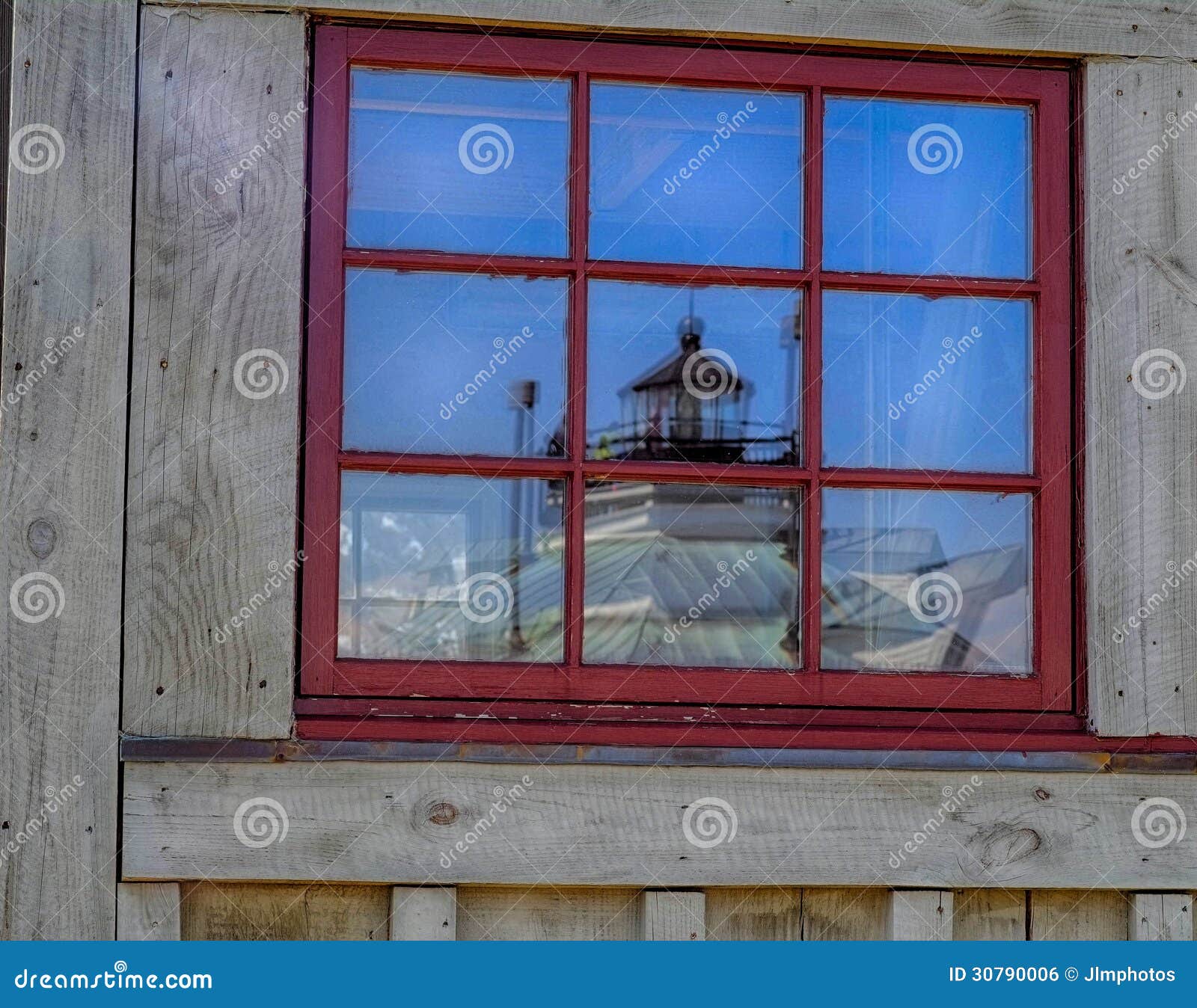 Historic Hooper Strait Lighthouse Reflected in Window Stock Photo ...