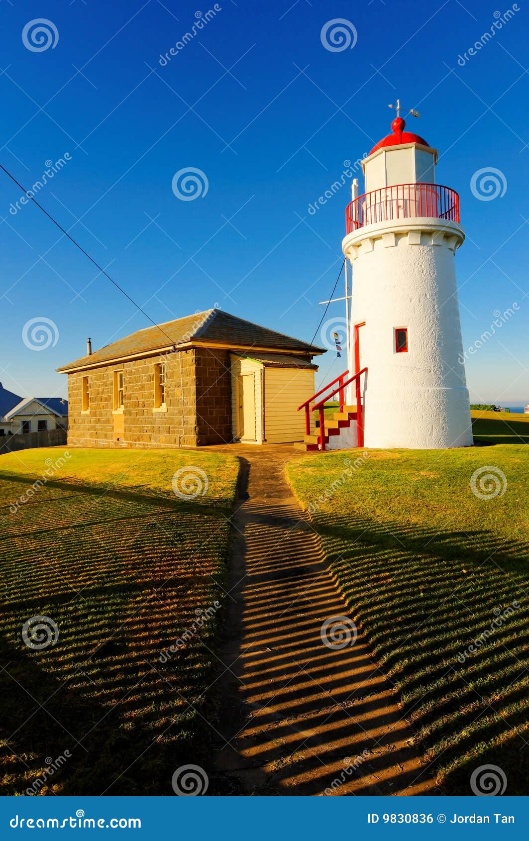 Historic Lighthouse and Cottage Stock Photo - Image of direct, historic ...