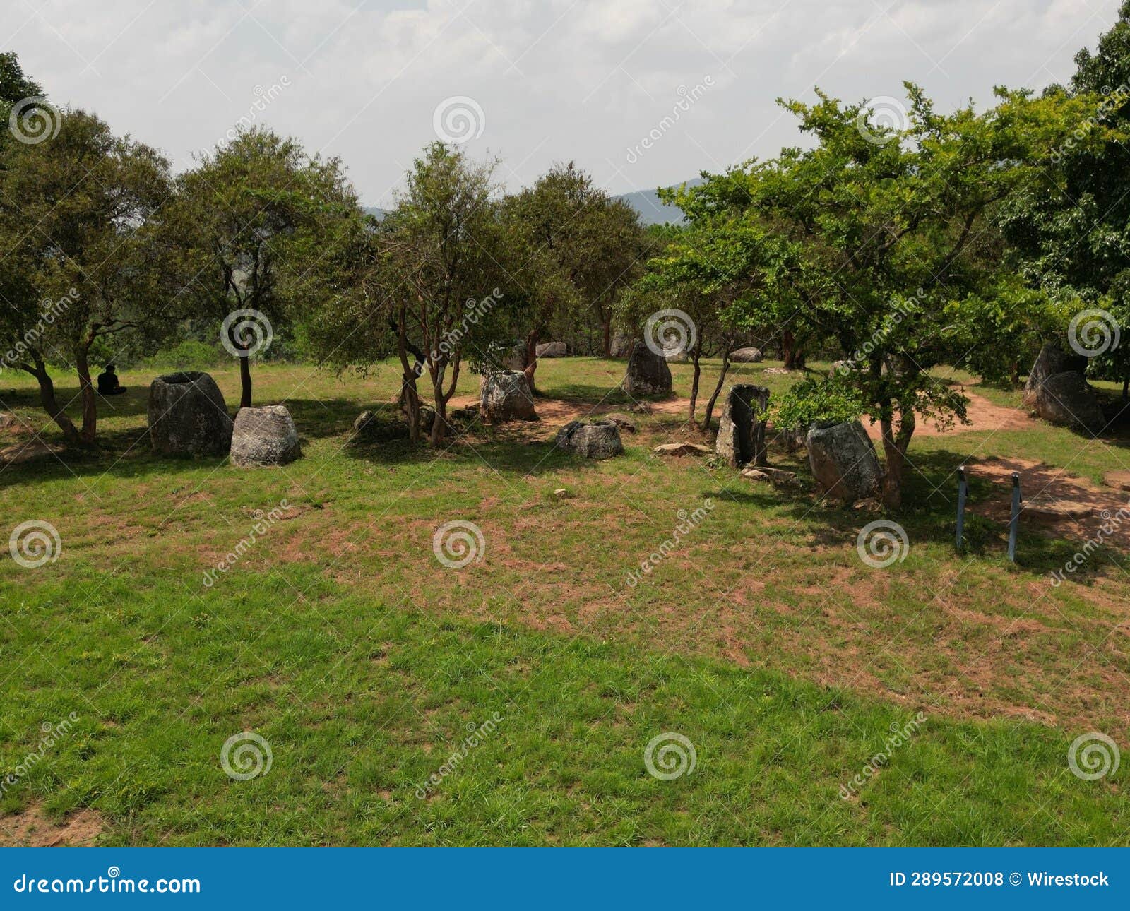 Historic Plain of Jars on a Grassy Green Field in Laos Stock Photo ...