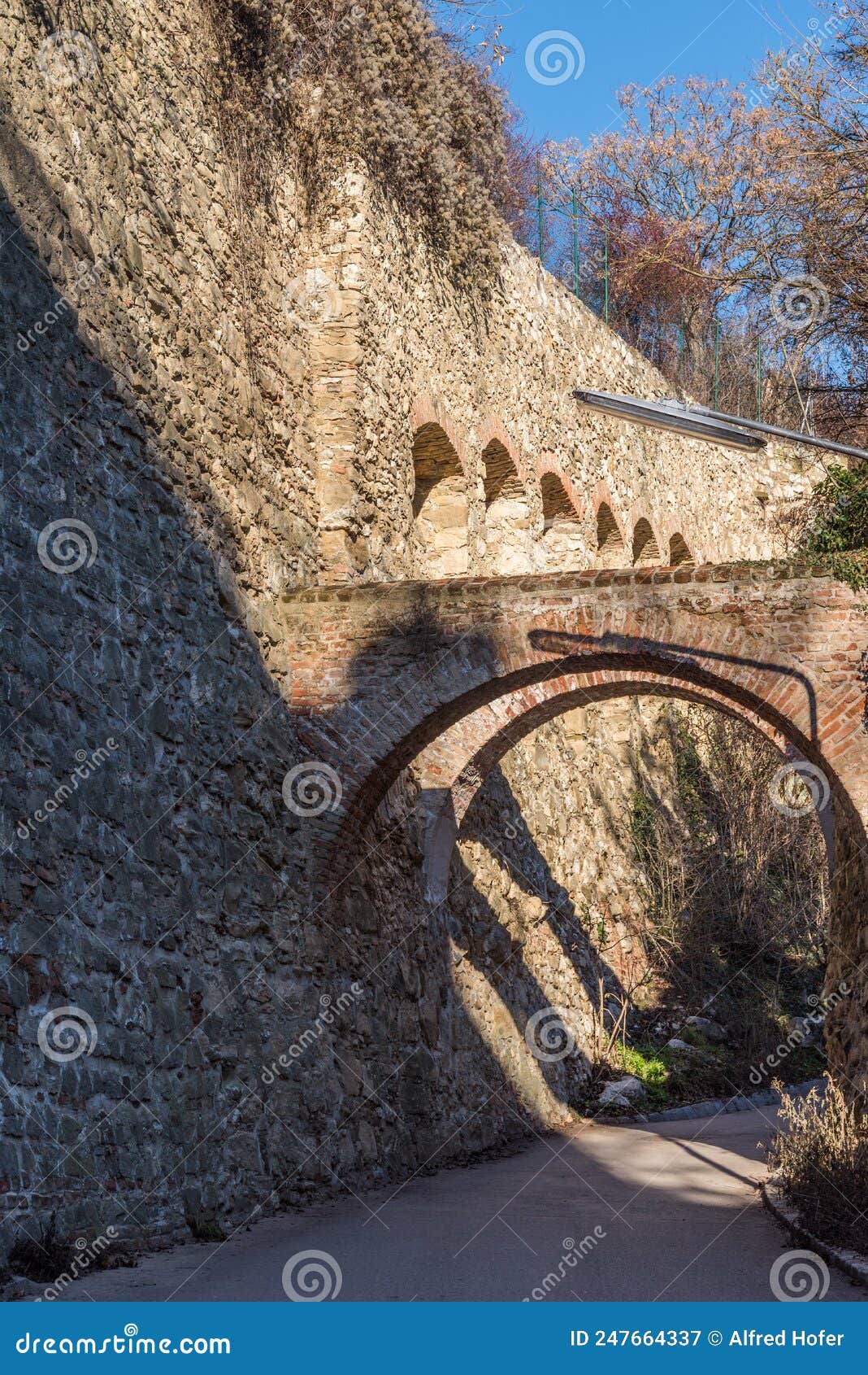 Historic Stone Wall with Archway Stock Image - Image of rock, stones ...