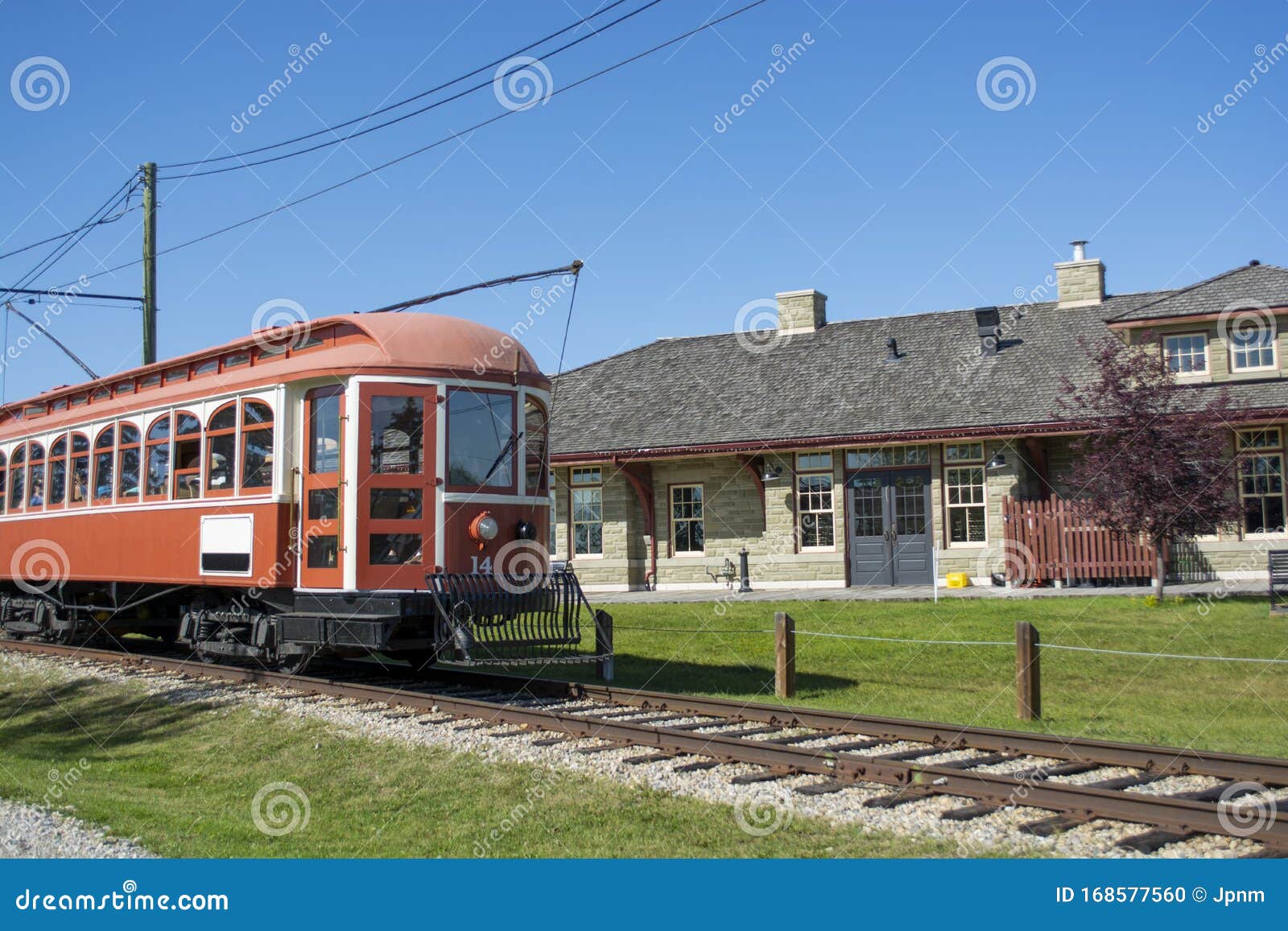 Historic Trolley Transit Train beside Train Station Stock Photo - Image ...
