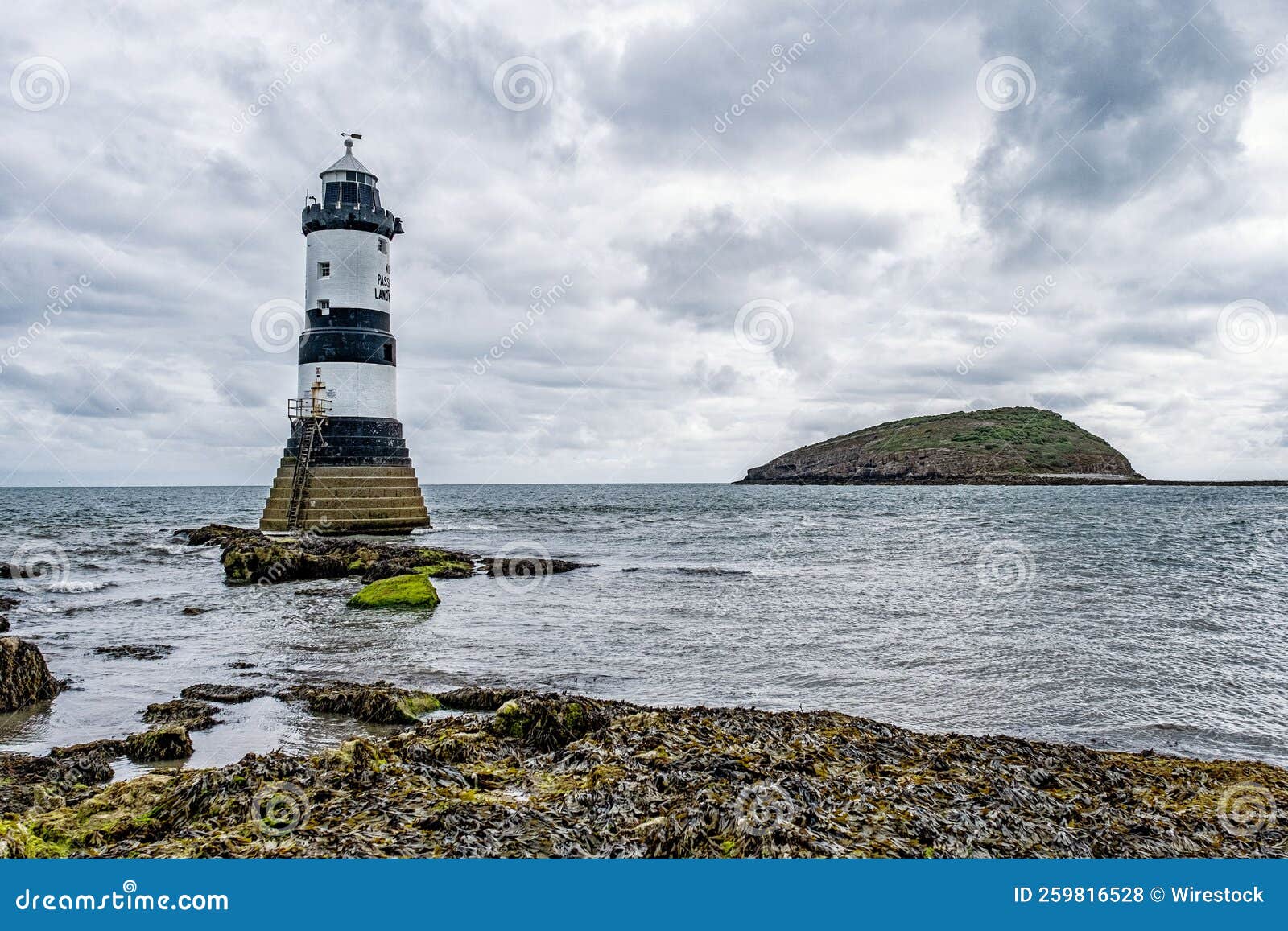 Historic Trwyn Du Penmon Lighthouse on the Shore in Penmon, Wales Stock ...