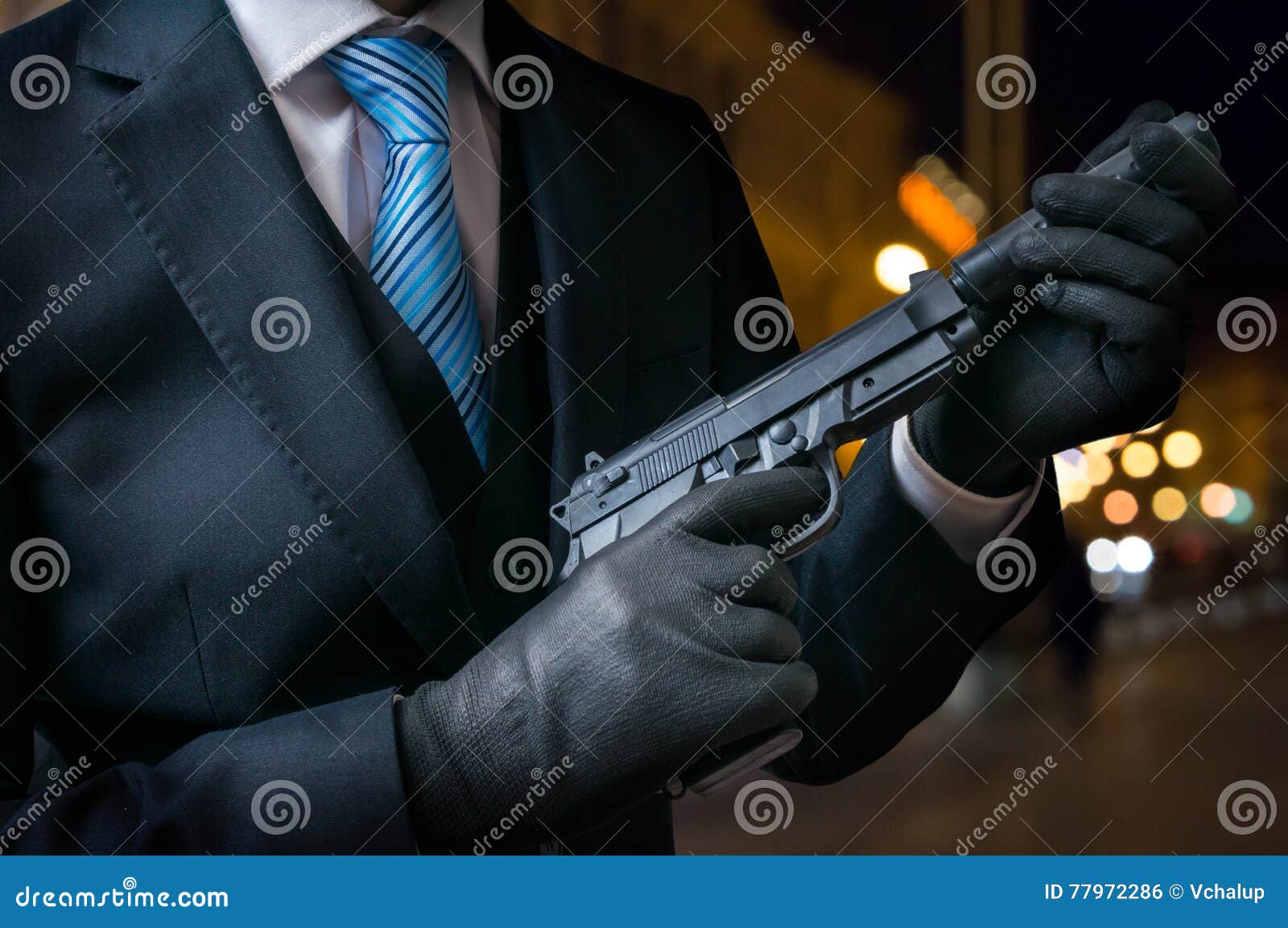Hitman or Assassin Holds Pistol with Silencer in Hands Stock Photo ...