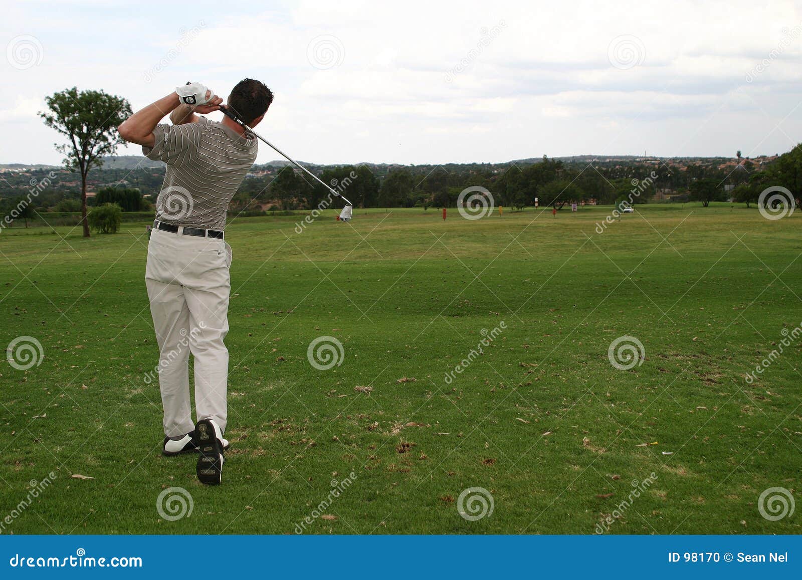 Hitting the bal stock photo. Image of golf, grass, stroke - 98170
